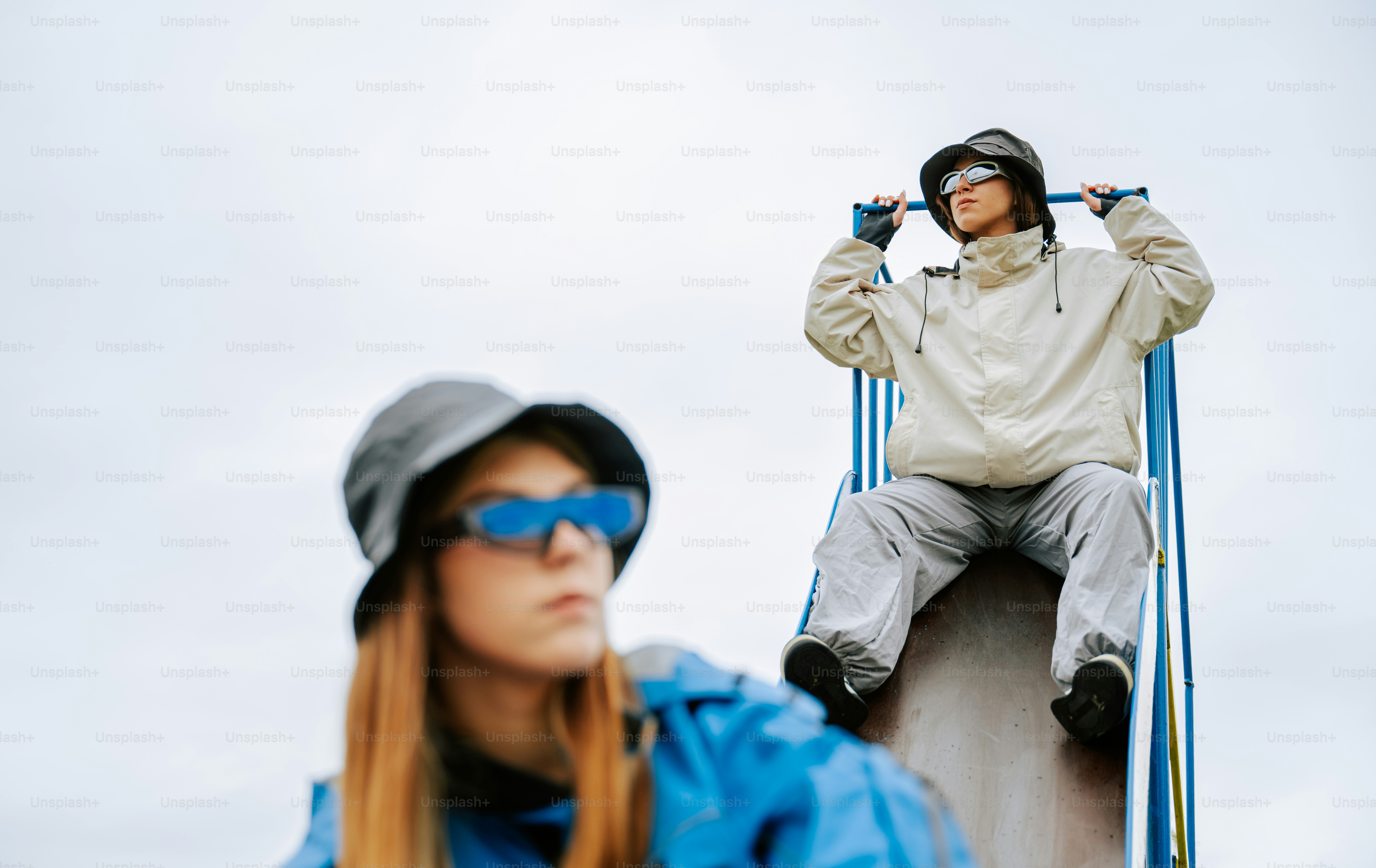 Two people on a playground slide photo – Fashion Image on Unsplash