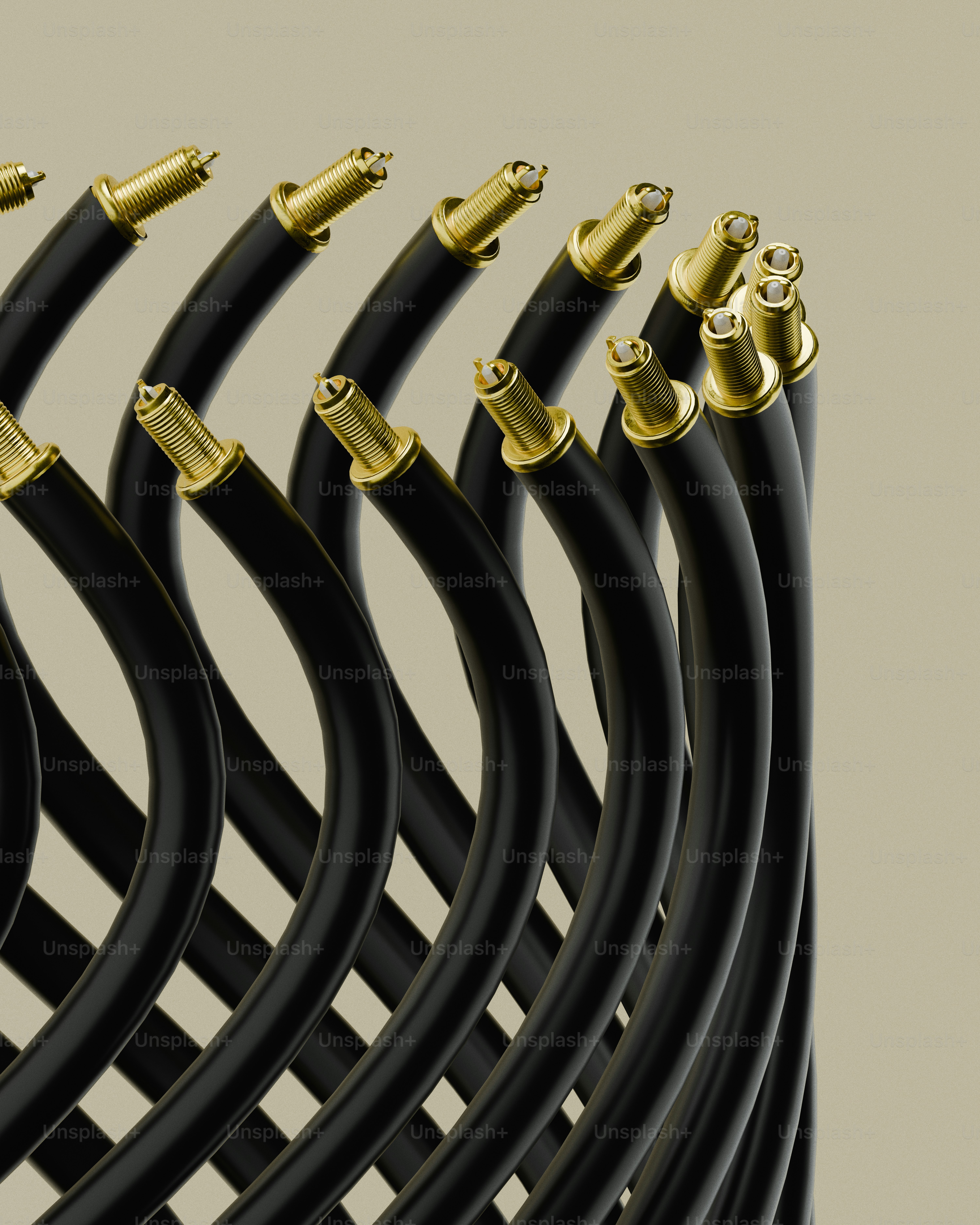 Several black cables with gold connectors arranged in a curve. photo ...