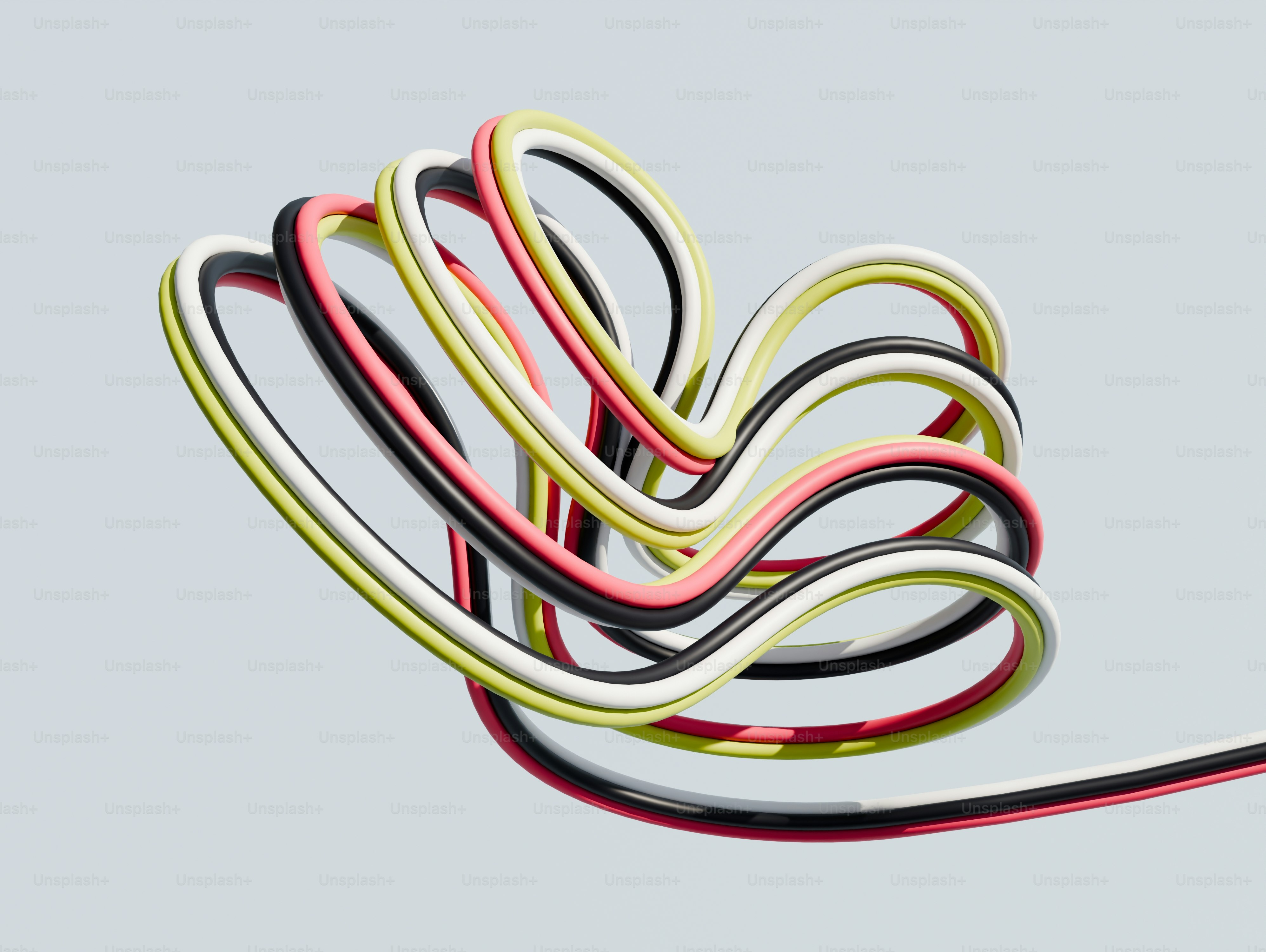 Colorful wires twisted into abstract shapes on white background photo ...
