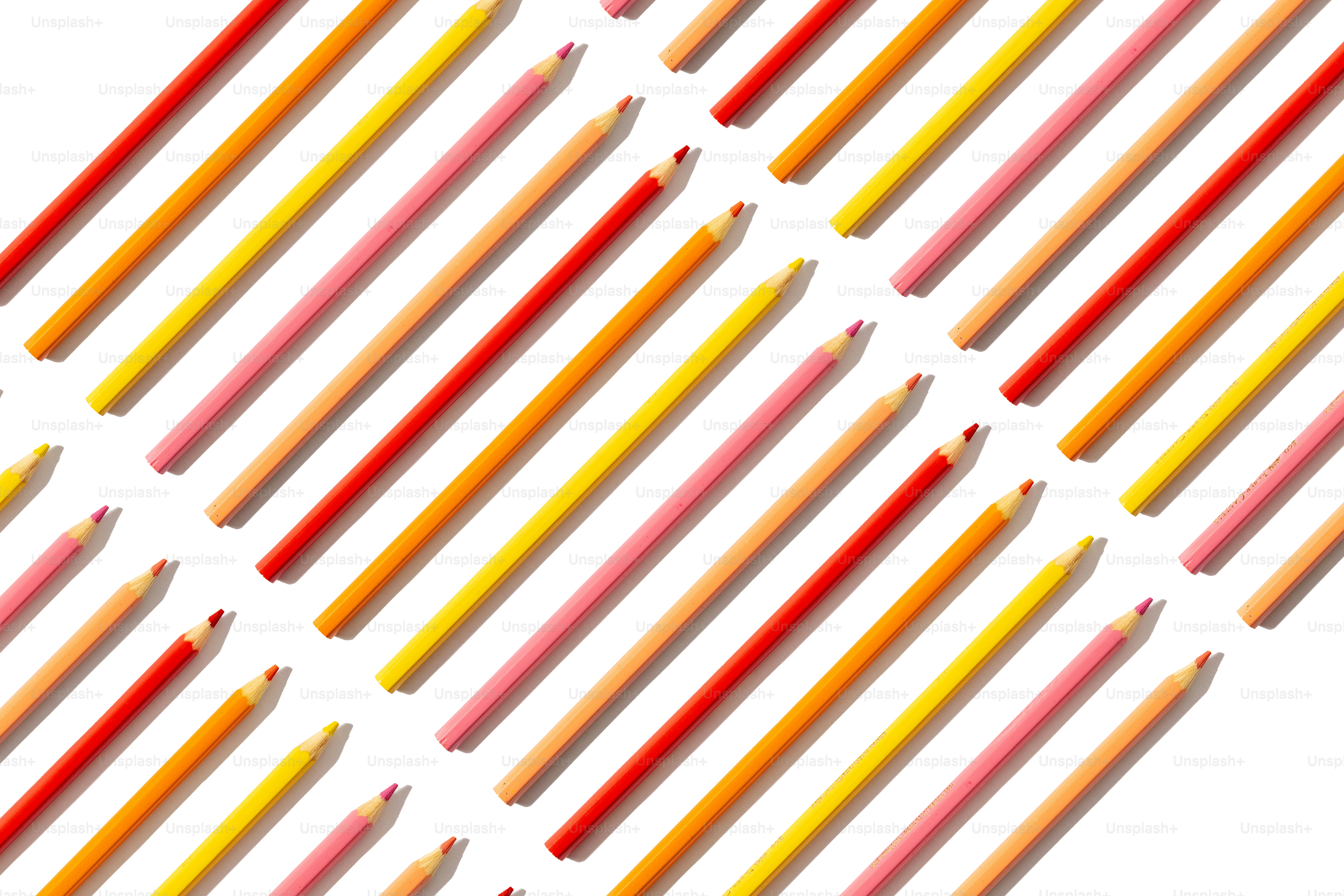 Colorful pencil sharpeners arranged in rows photo – Office Image on ...