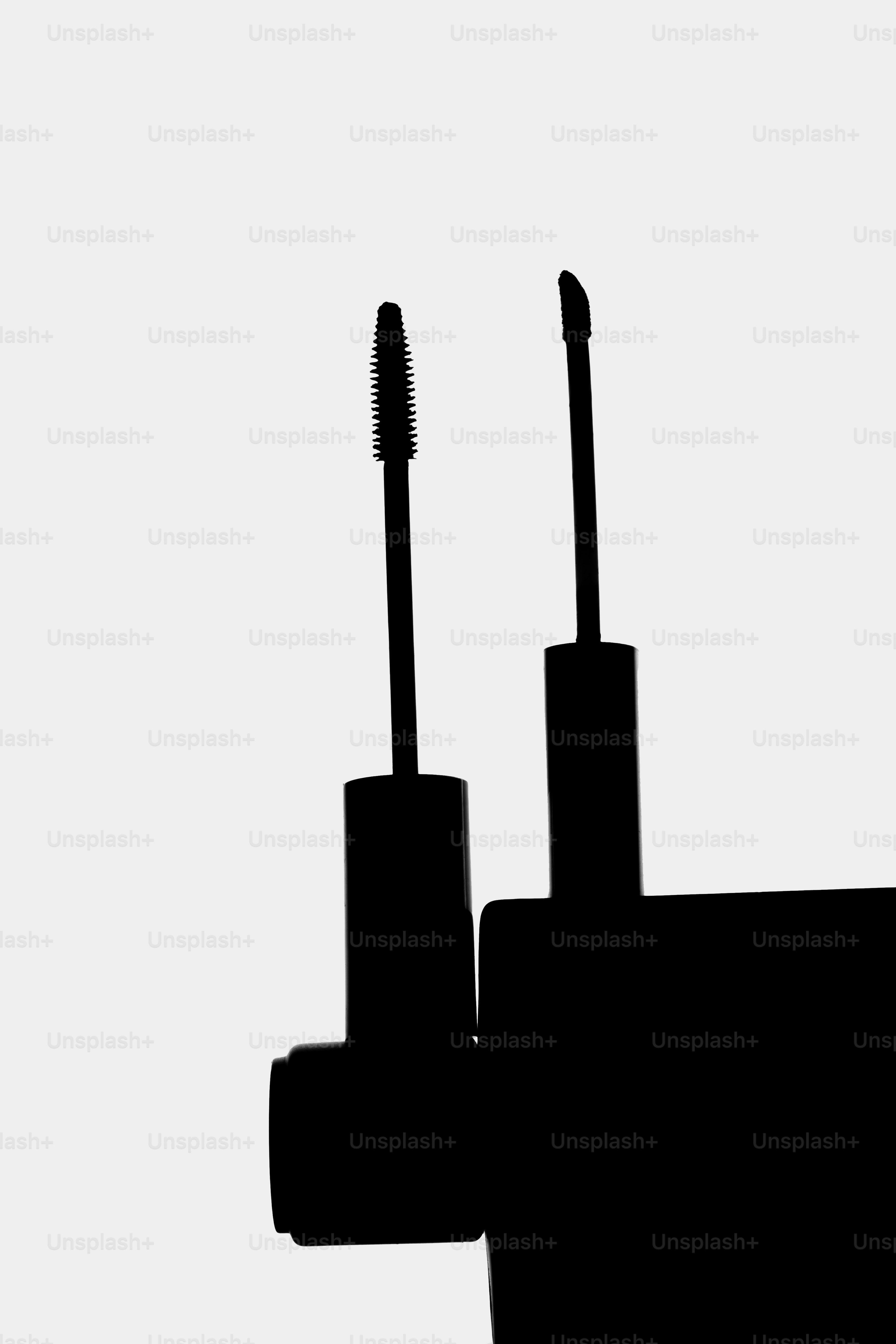 Close-up silhouette of a camera flash unit with lens attachment photo ...