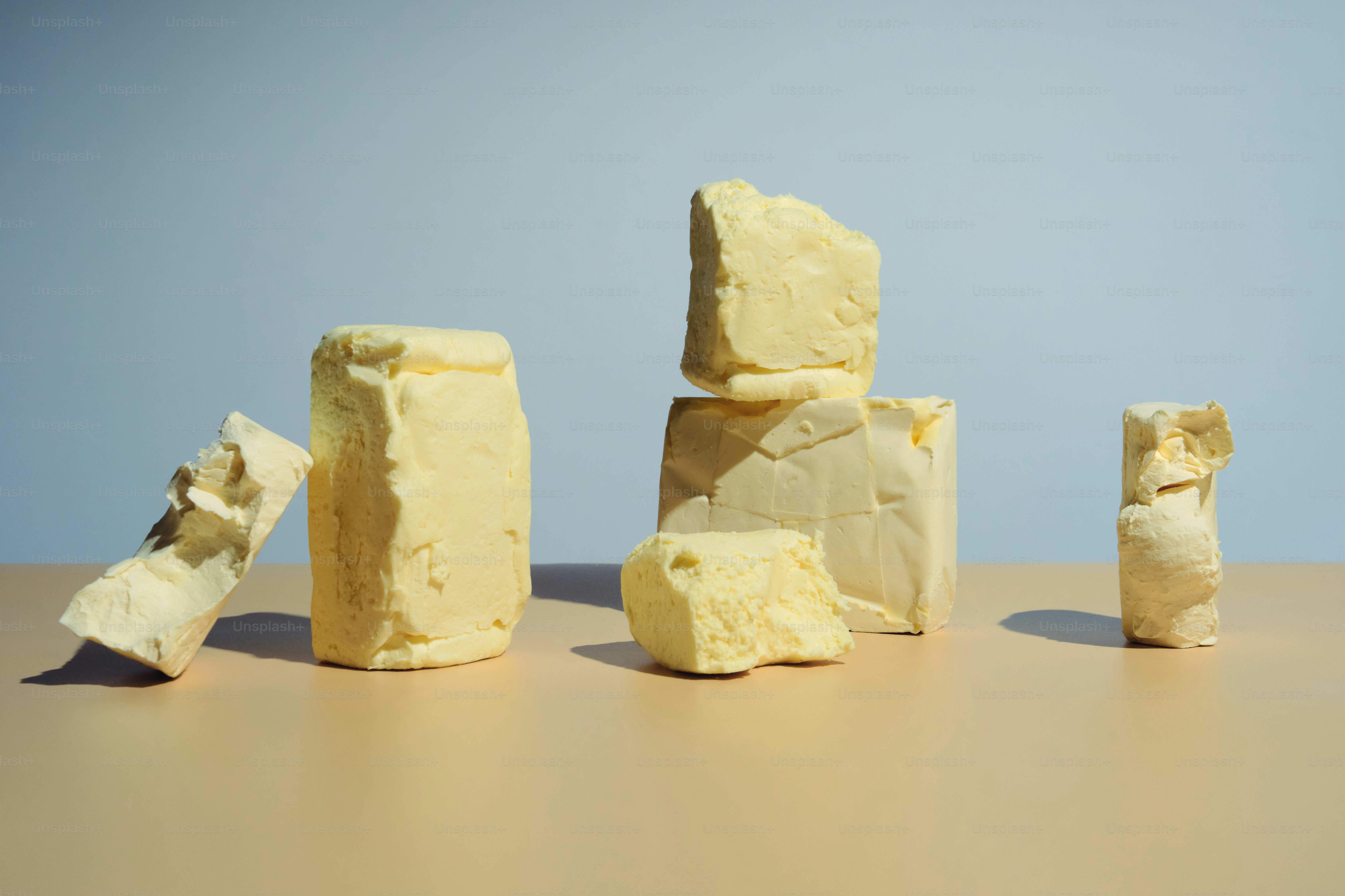 Several pale yellow blocks arranged on a surface photo – Aesthetic ...