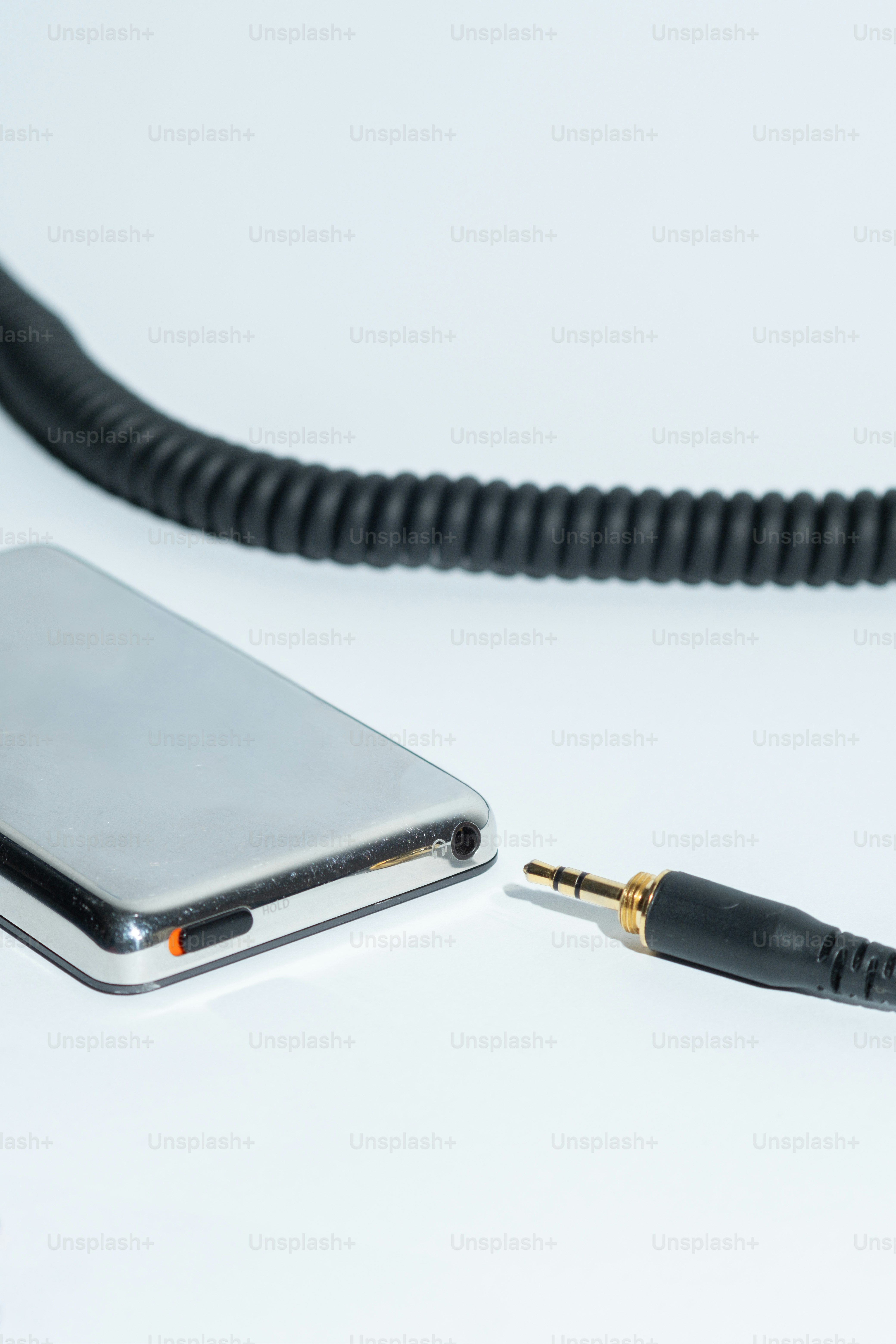 A small silver digital camera on a white background photo – Technology ...