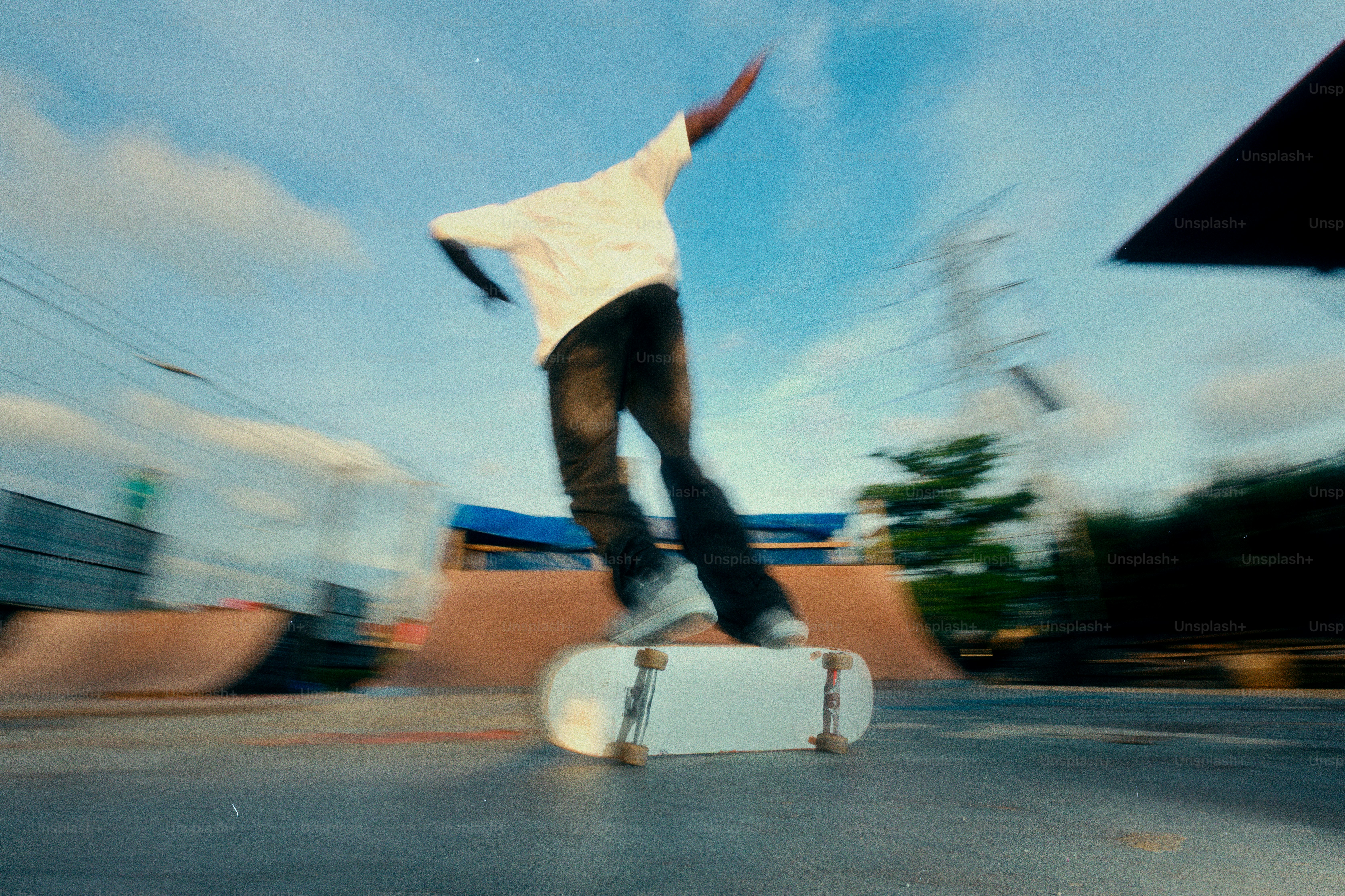 A person skateboarding at a skatepark. photo – Skateboarding Image on ...