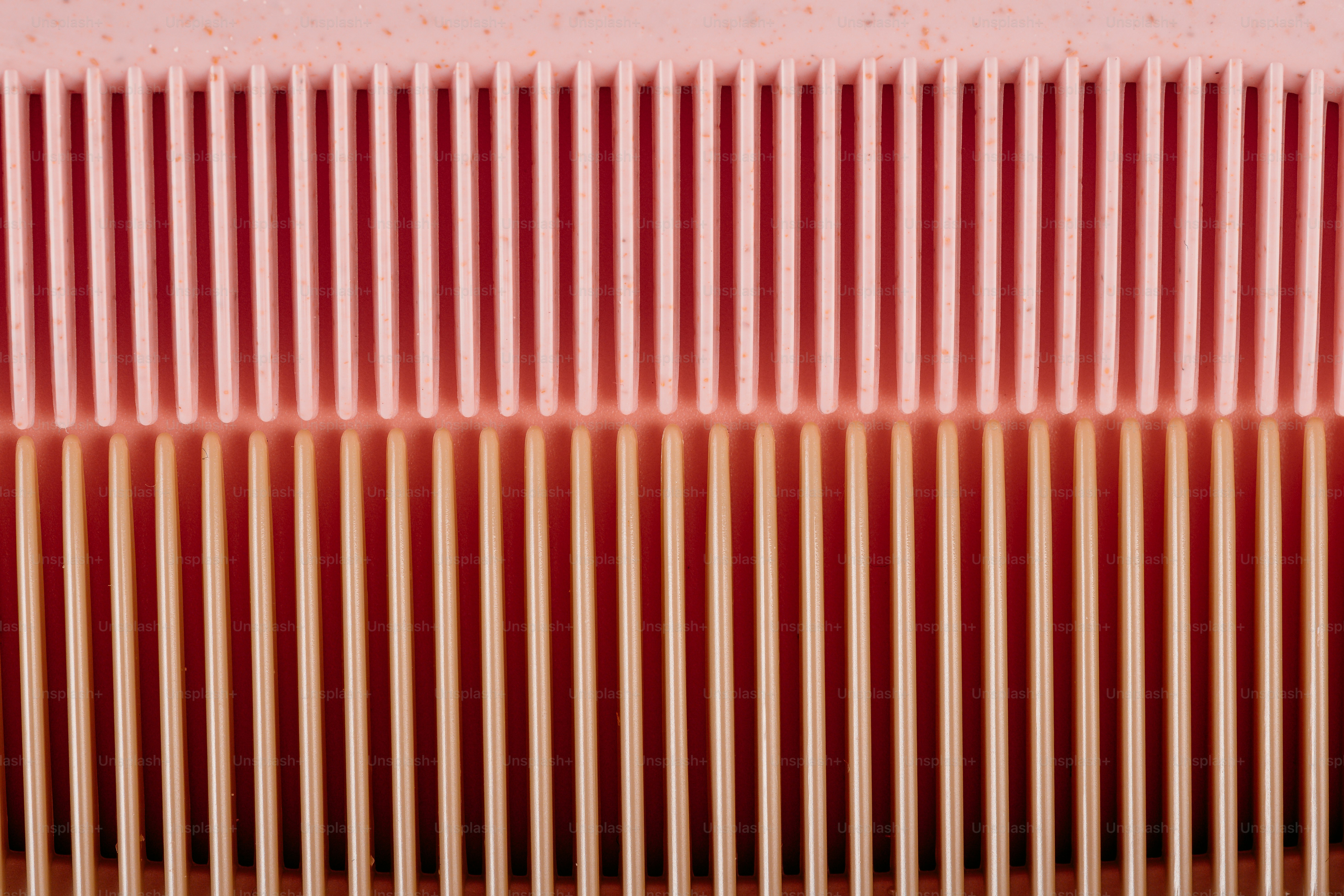 Two rows of pink and beige vertical fins photo – Editorial Image on ...