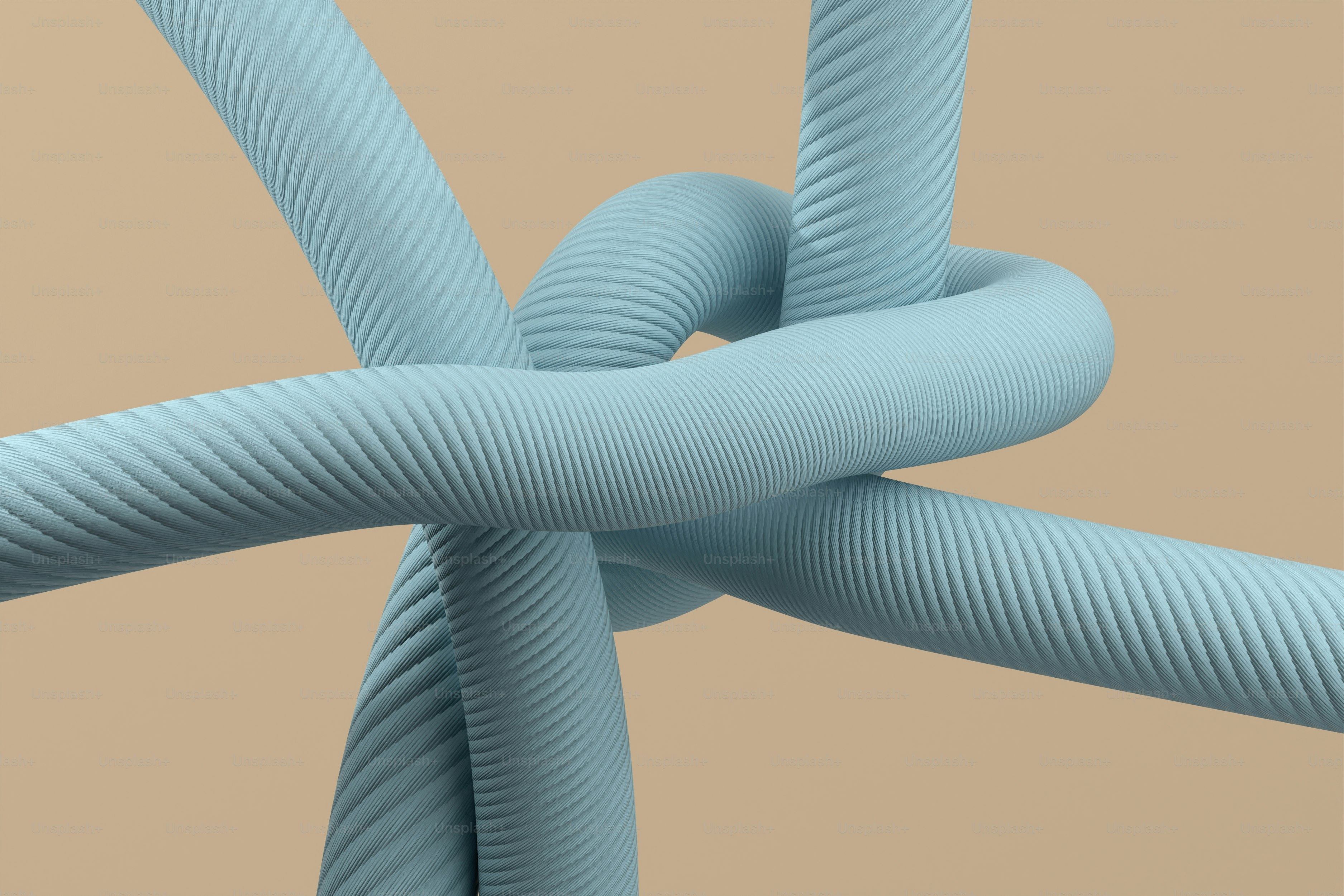 Close-up of a thick, tan rope tied in a knot photo – Design Image on ...