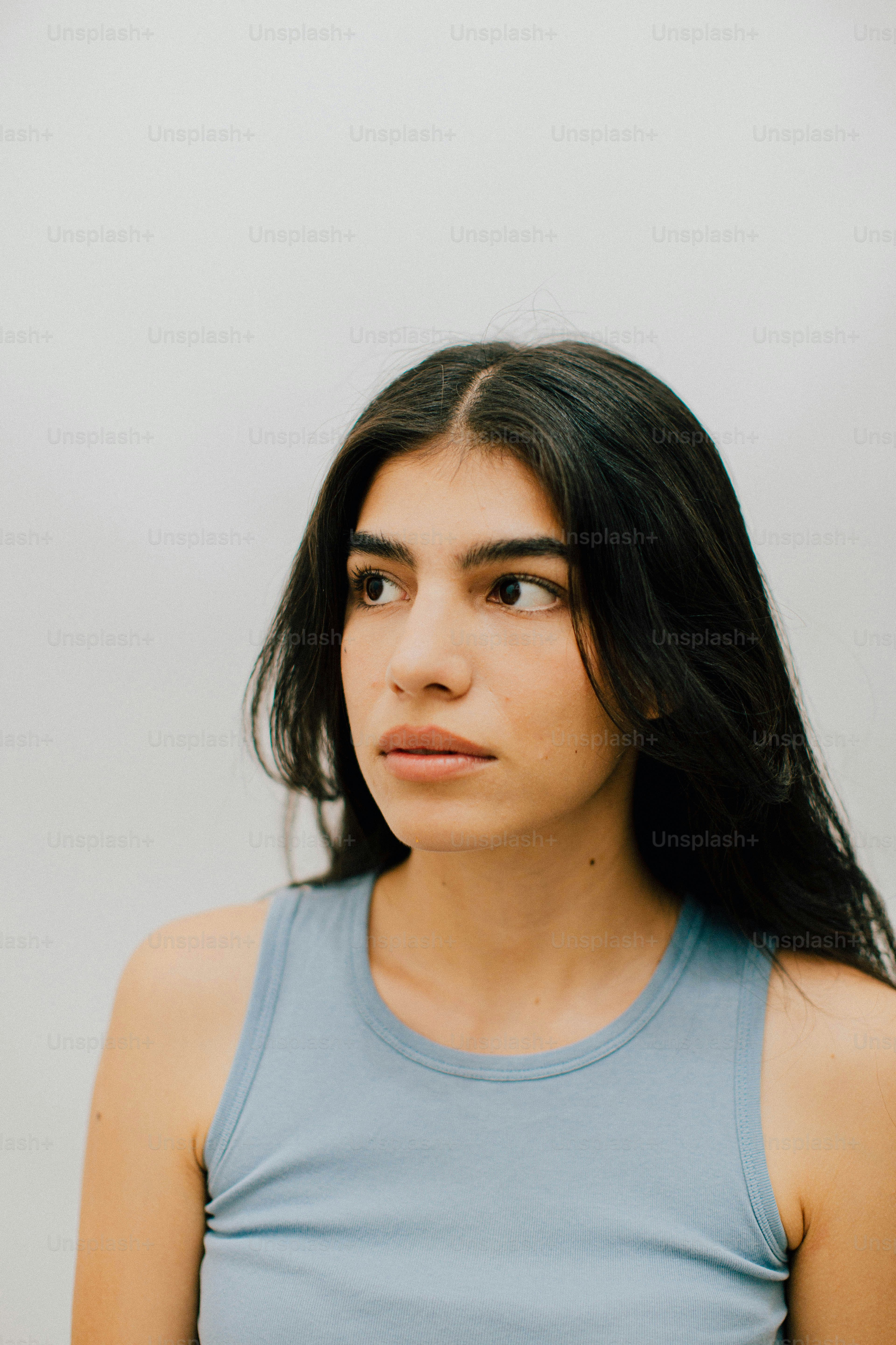 Young boy with dark hair and a blue shirt photo – Happy Image on Unsplash