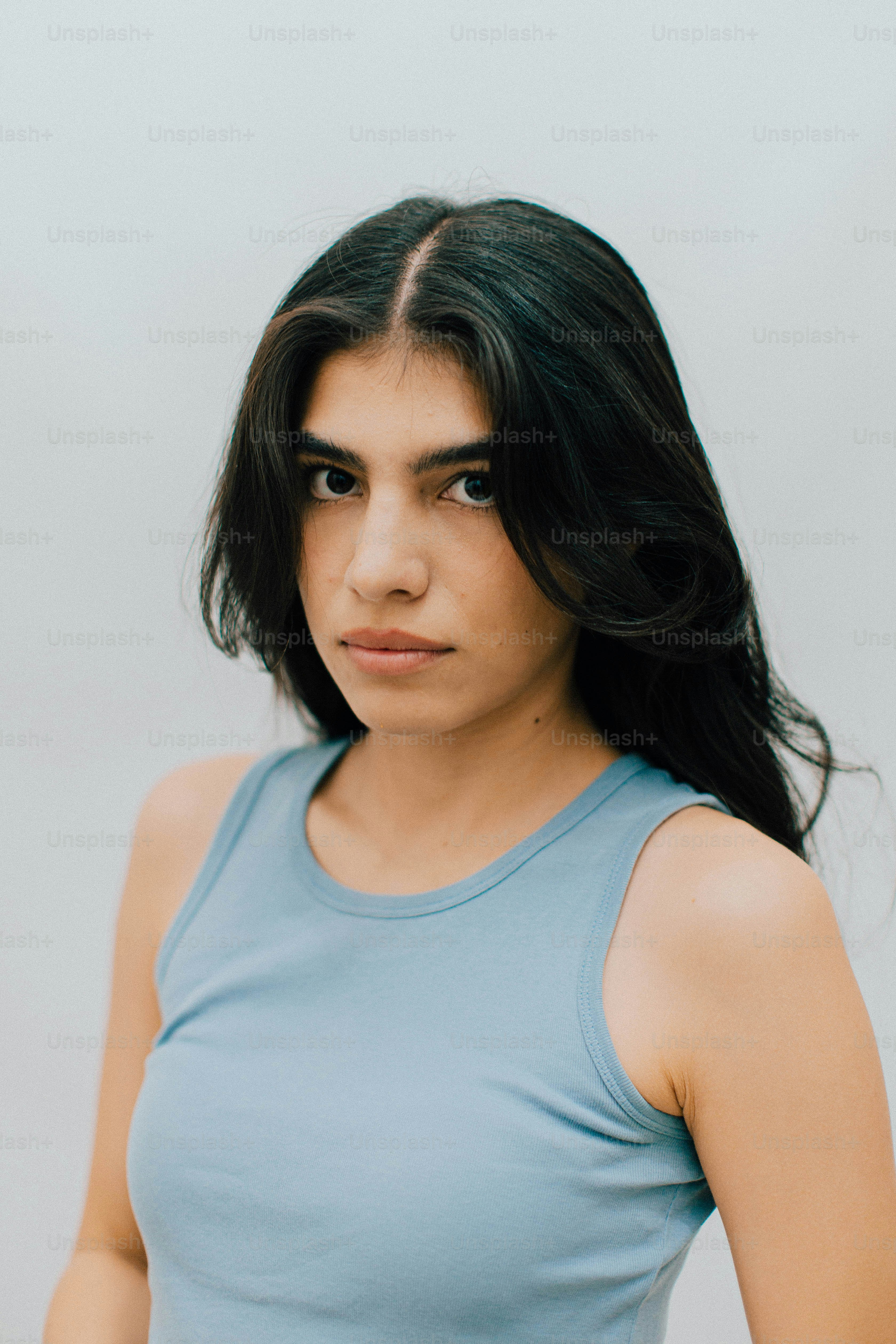 Young boy with dark hair and a blue shirt photo – Happy Image on Unsplash