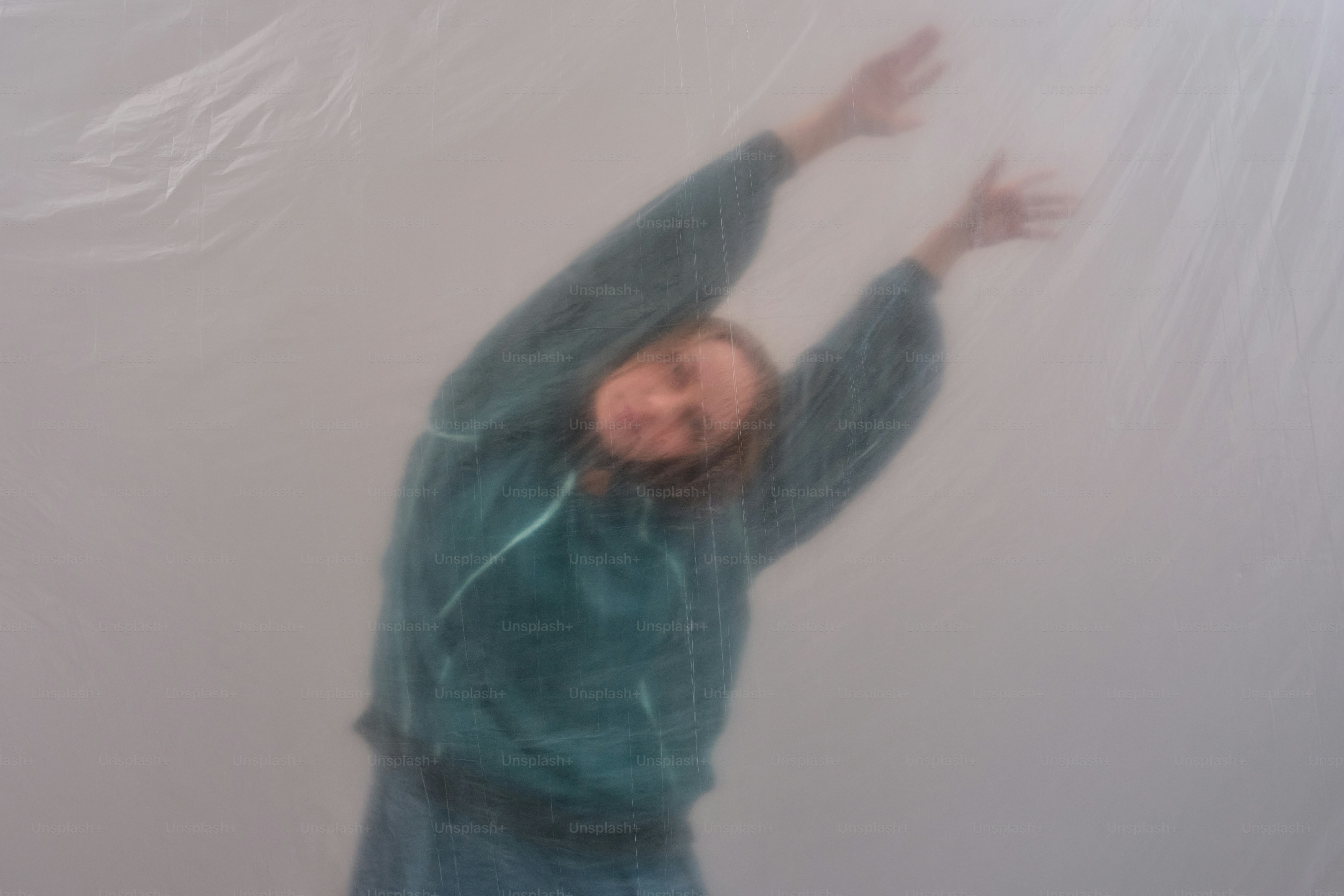 Man behind a translucent plastic sheet photo – Portrait Image on Unsplash