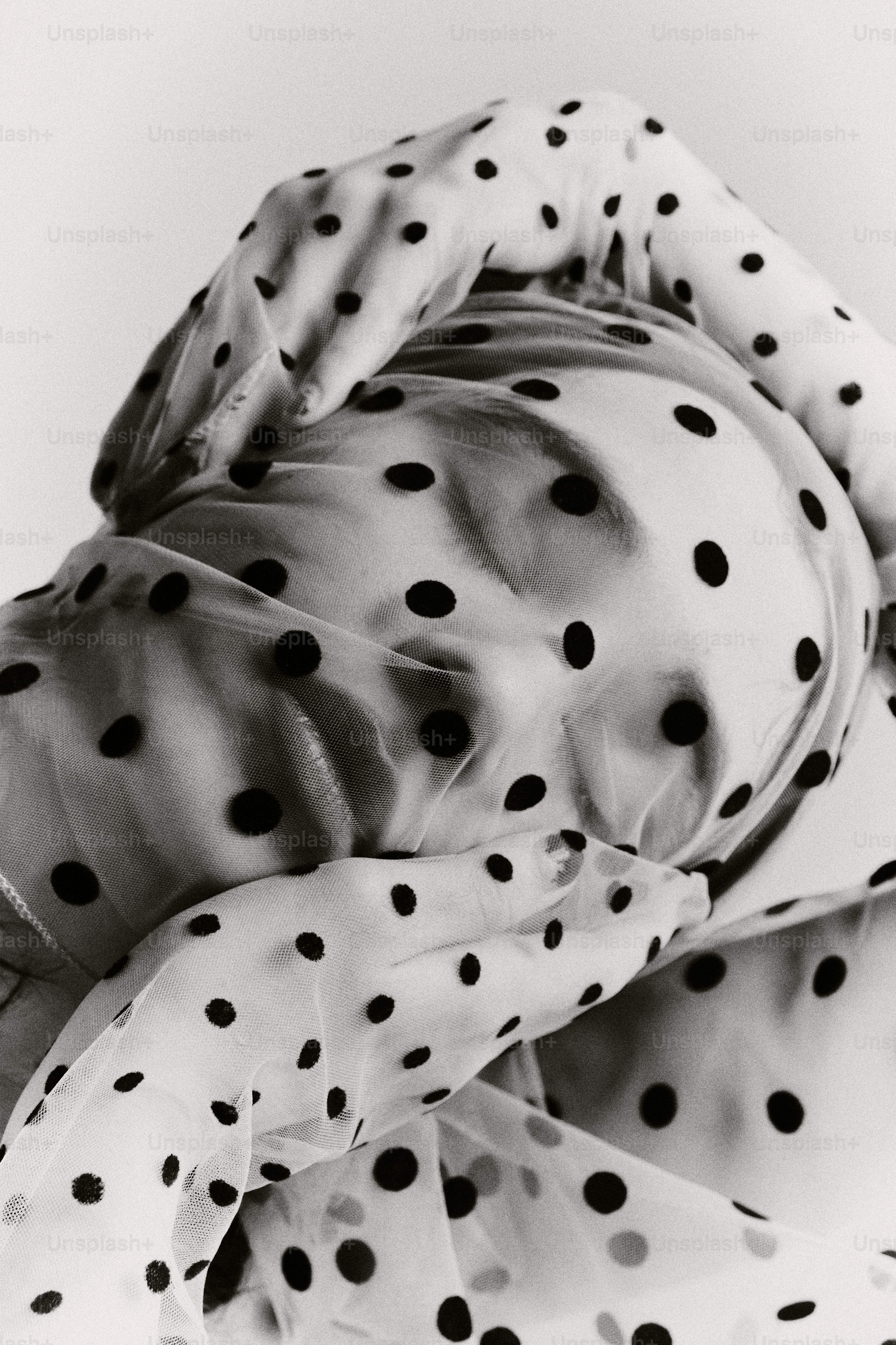 Woman in sheer polka dot fabric covering face photo – Portrait Image on ...