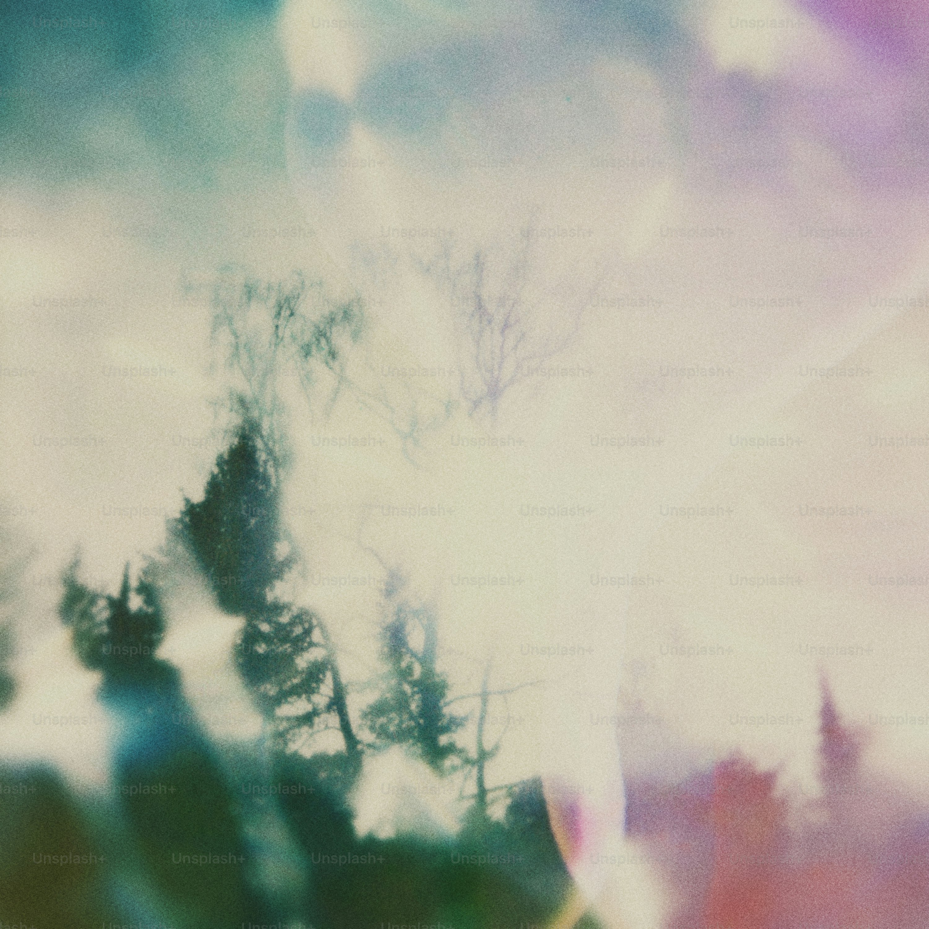 Abstract light streaks over a blurry landscape and water. photo ...