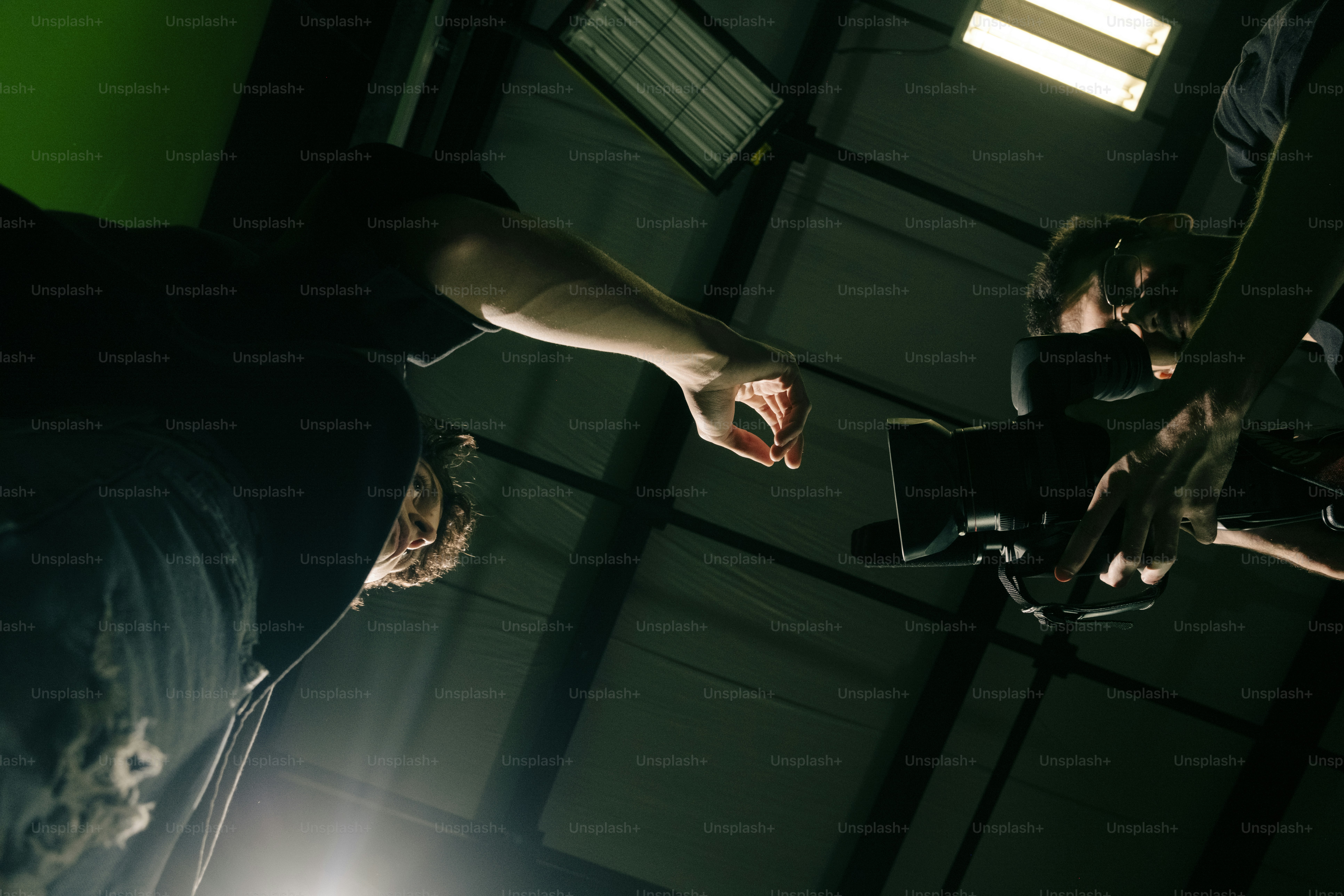 Filming a scene with a camera and green screen. photo – Bts Image on ...