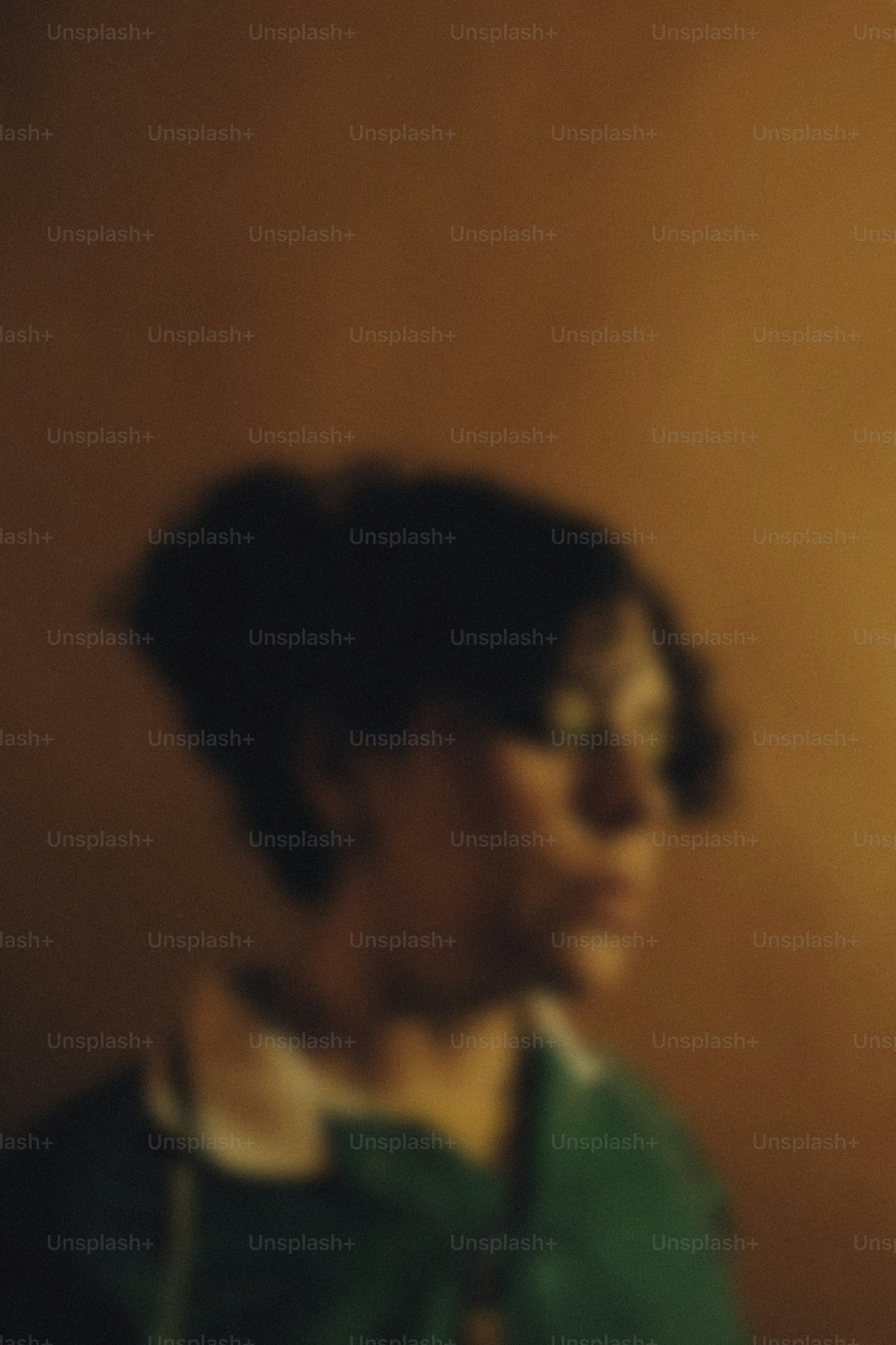 A blurry portrait of a person looking down. photo – Abstract art Image ...