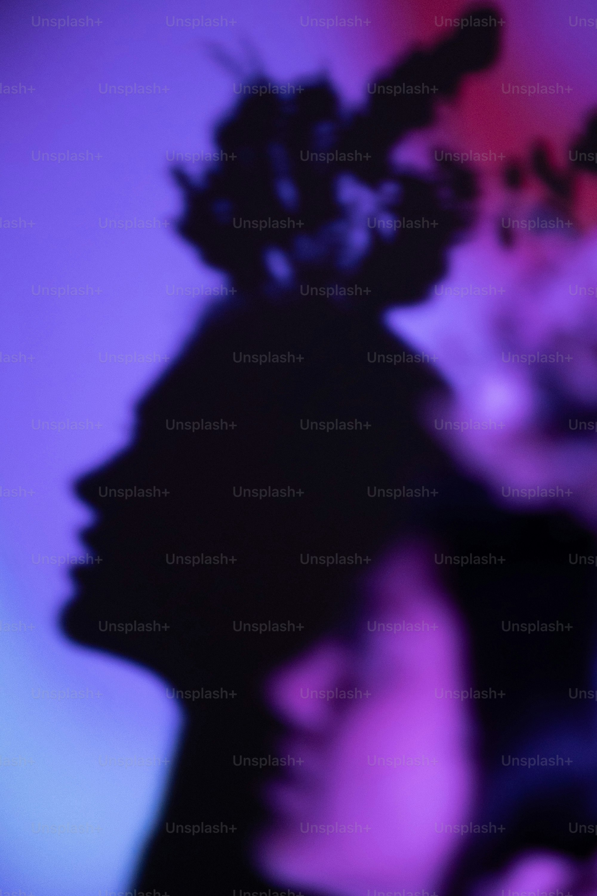 Silhouette of a hand reaching out against blue background photo ...