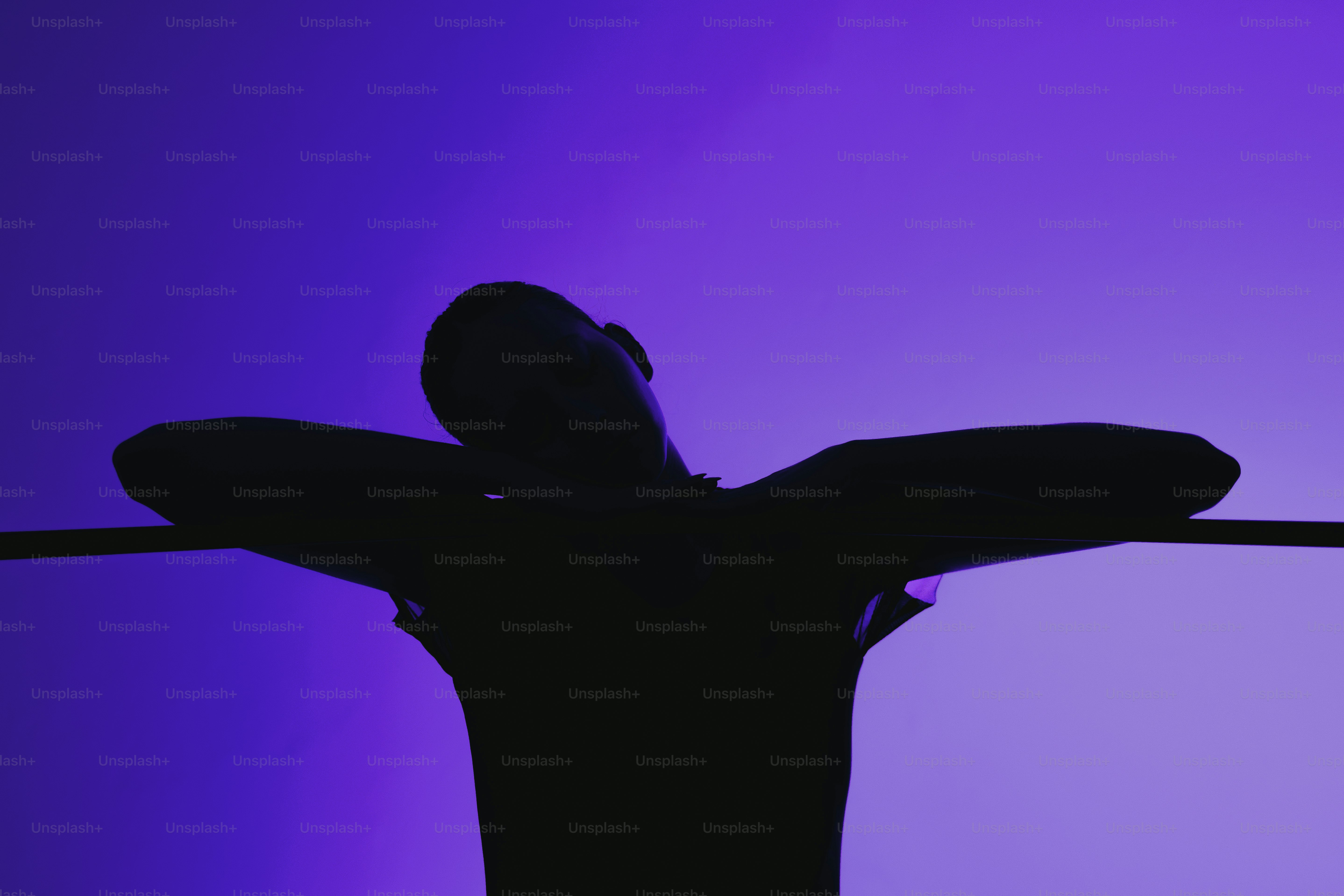 Silhouette of a dancer against a purple background photo – Profile ...