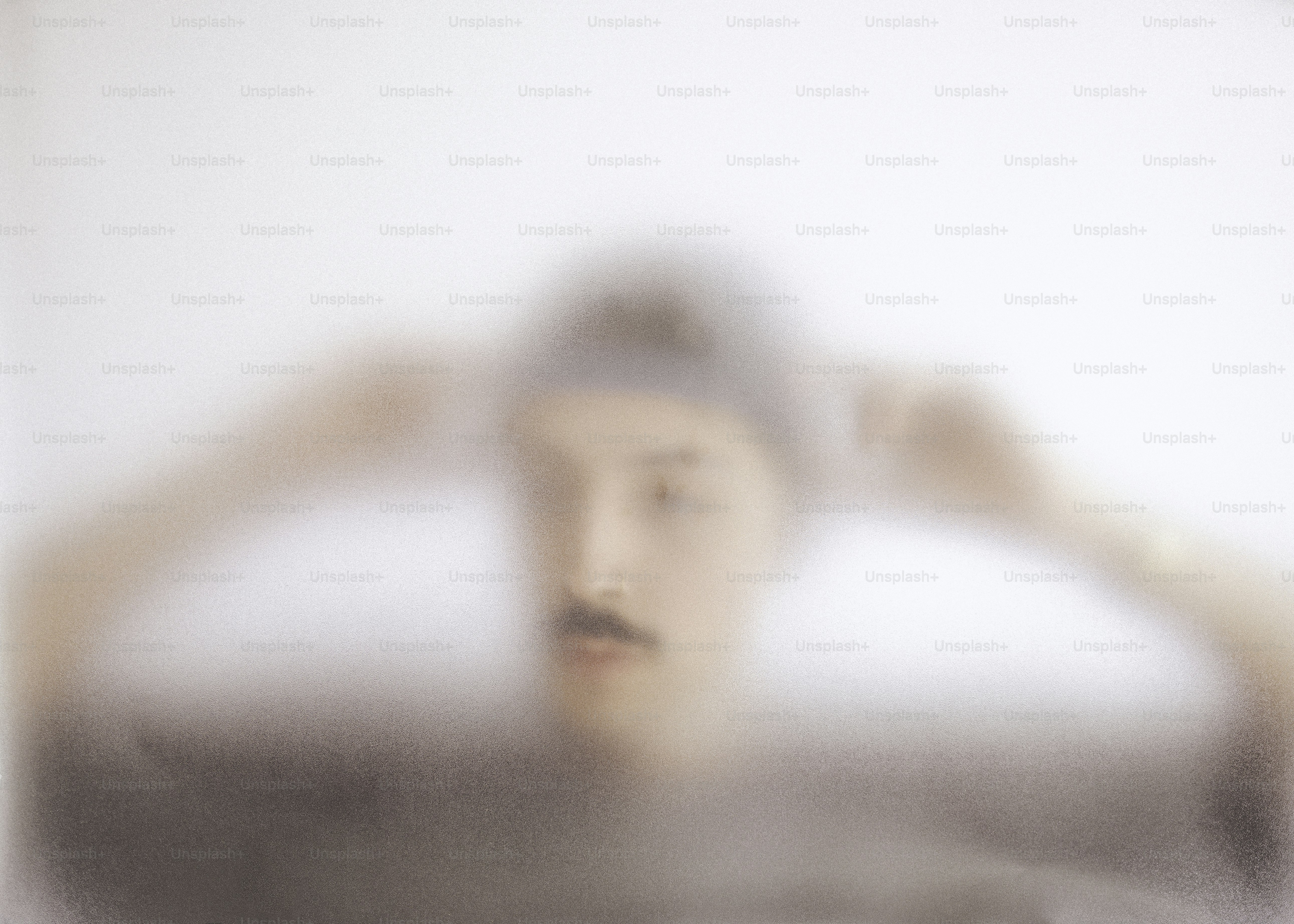 Man with mustache seen through frosted glass. photo – Portrait Image on ...