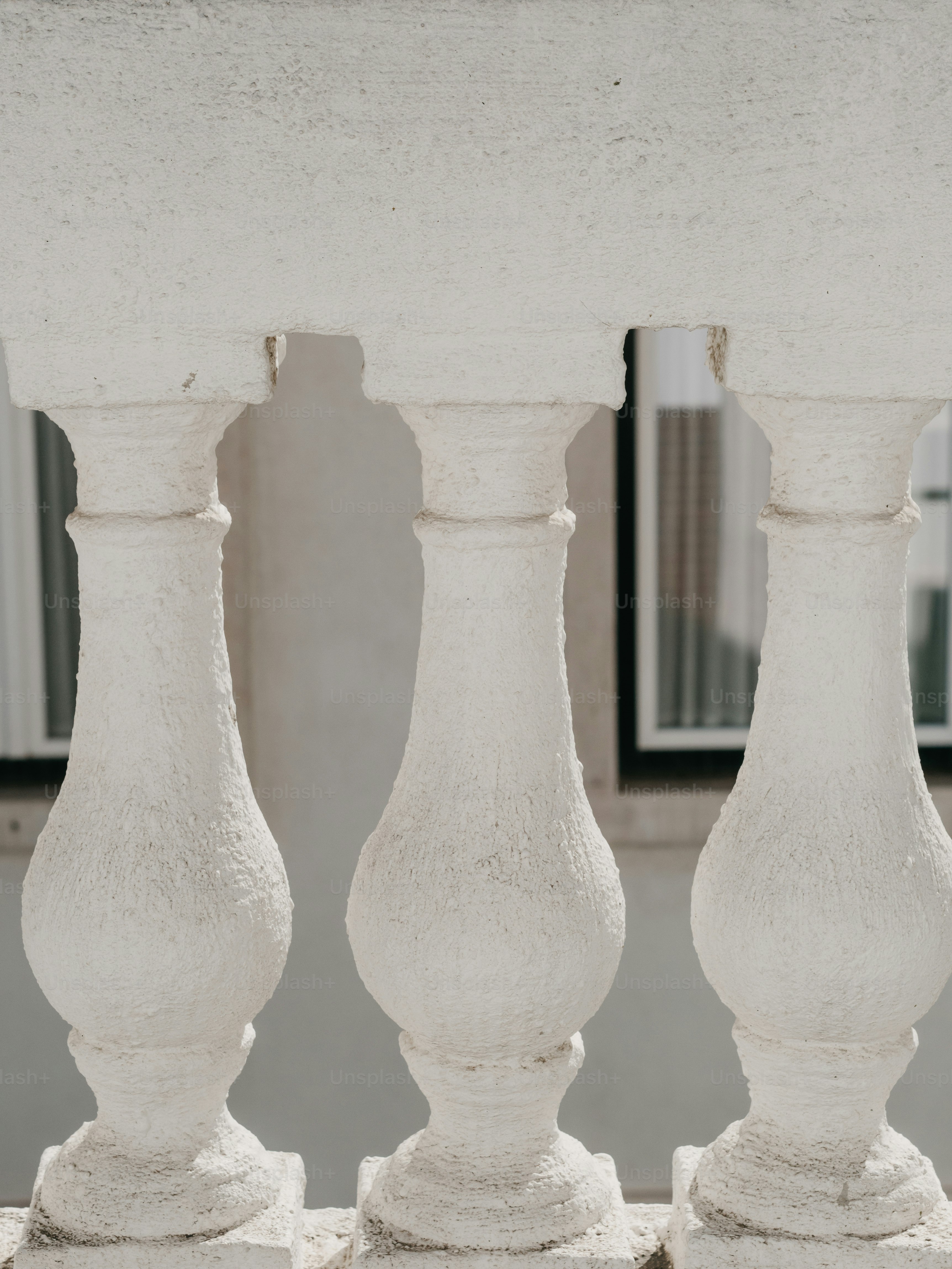 White balusters with windows in focus architectural detail photo ...