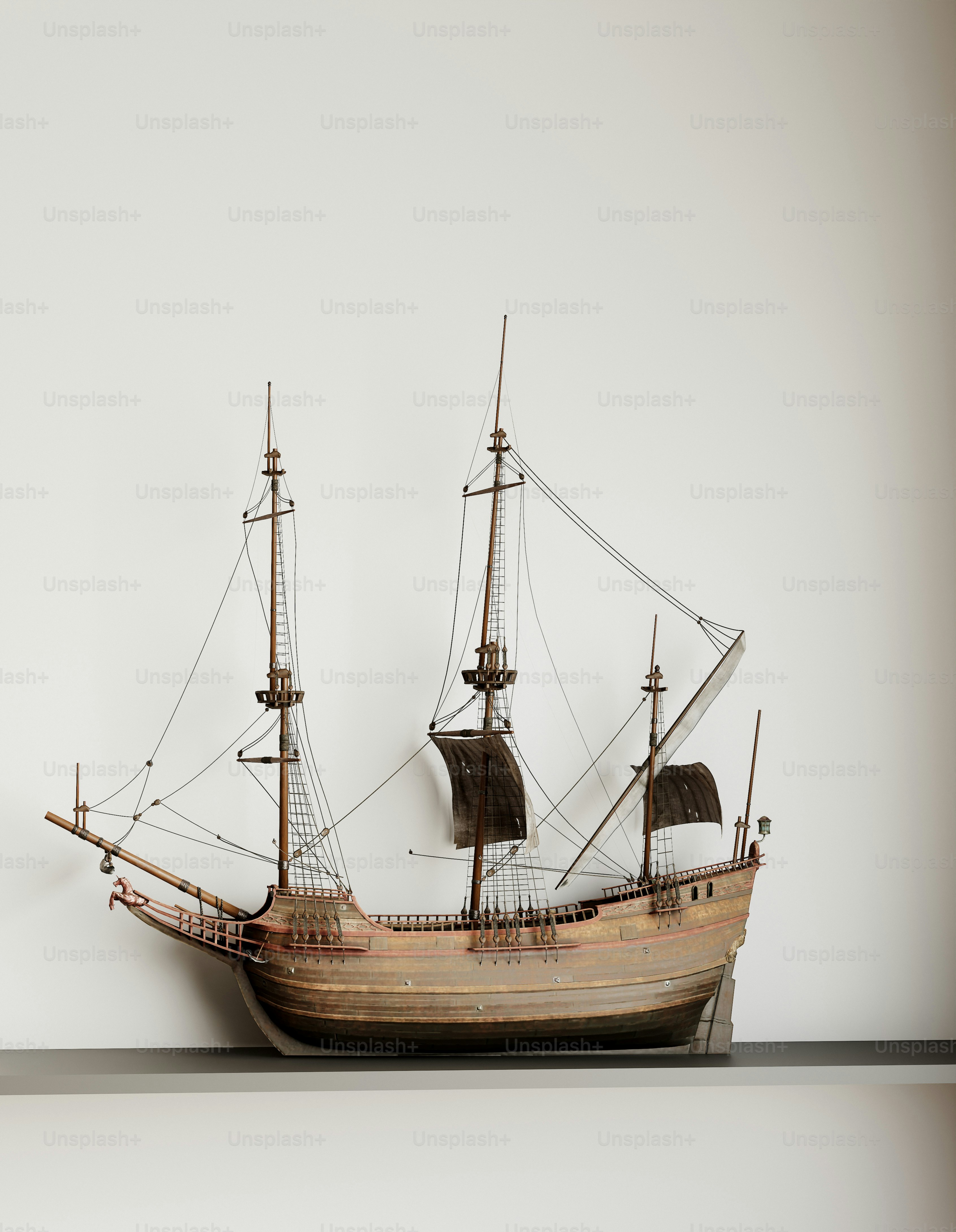 A detailed model of a historical sailing ship. photo – Image on Unsplash