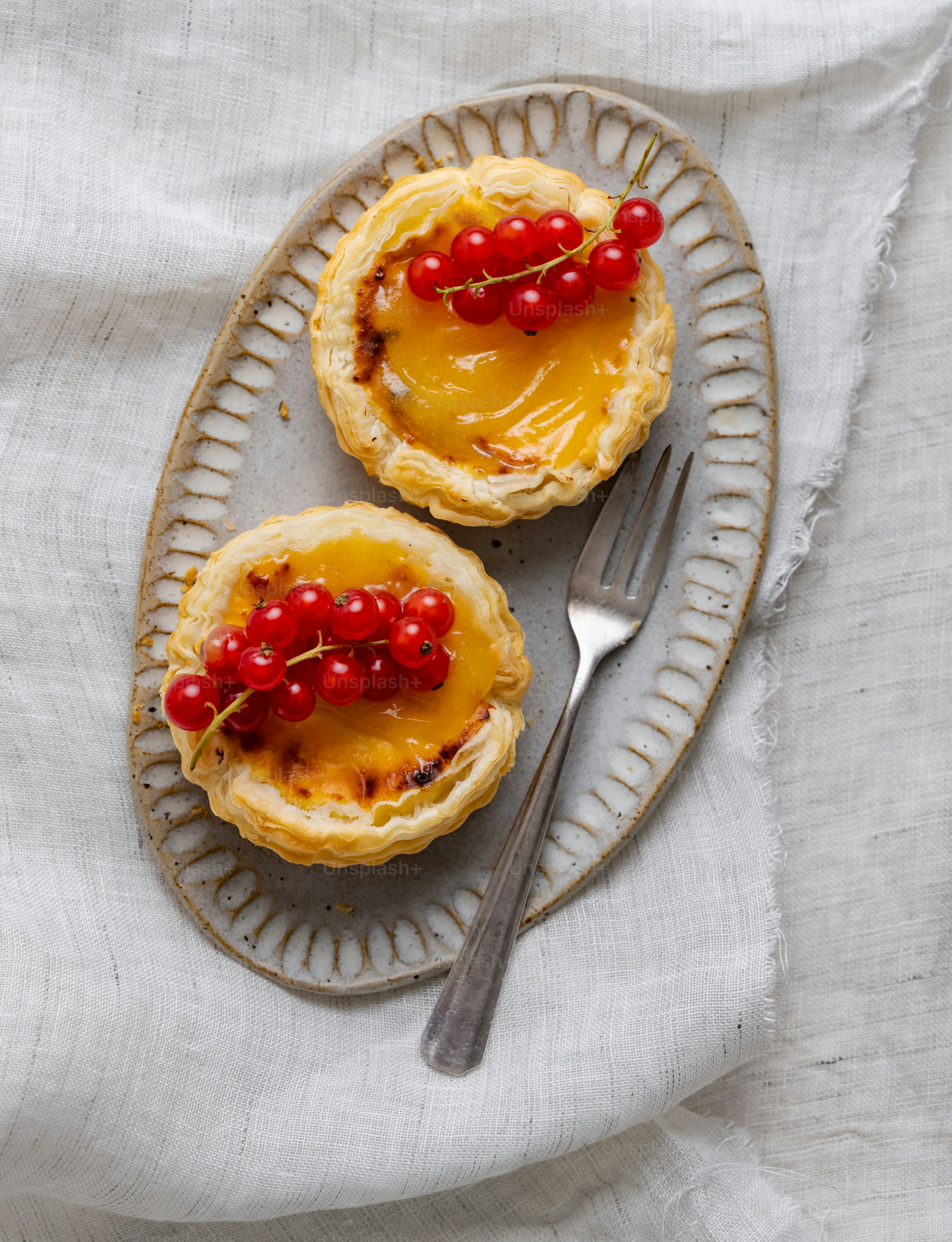 Savory crepe with egg, cheese, and herbs on plate. photo – Food Image ...