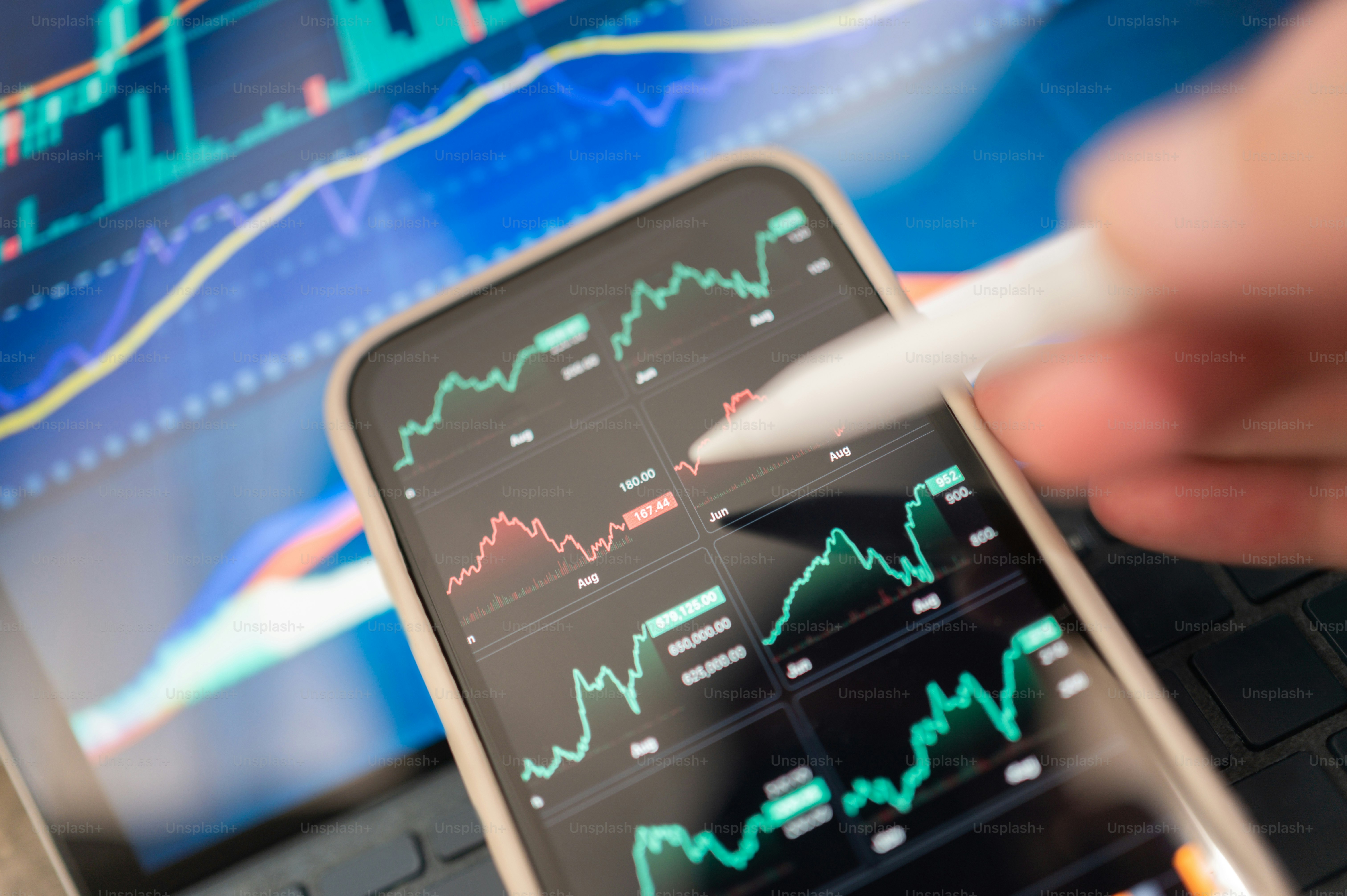 Hands using a stylus on a smartphone to interact with a sophisticated ...