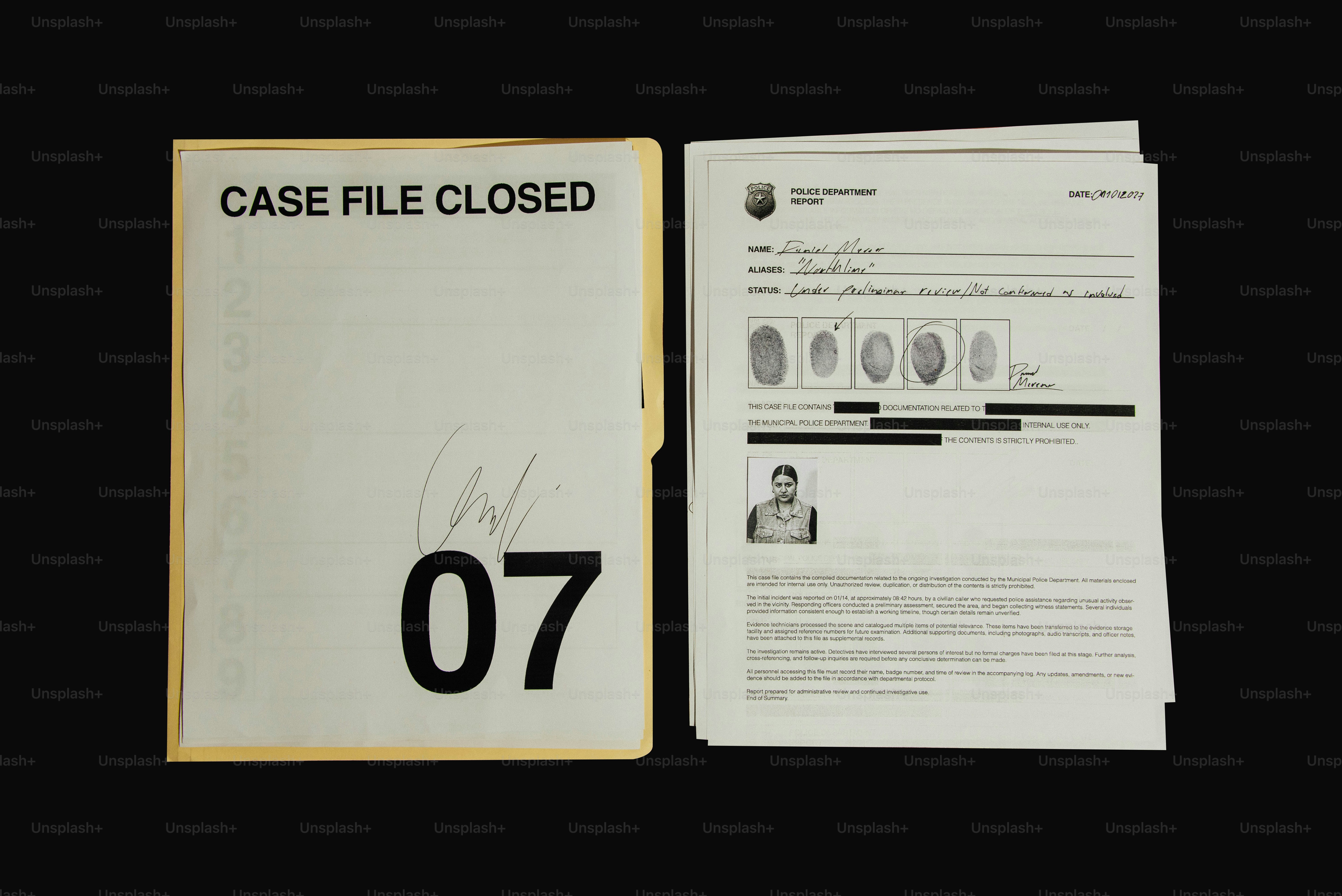 Case file closed with fingerprint and personal documents. photo ...