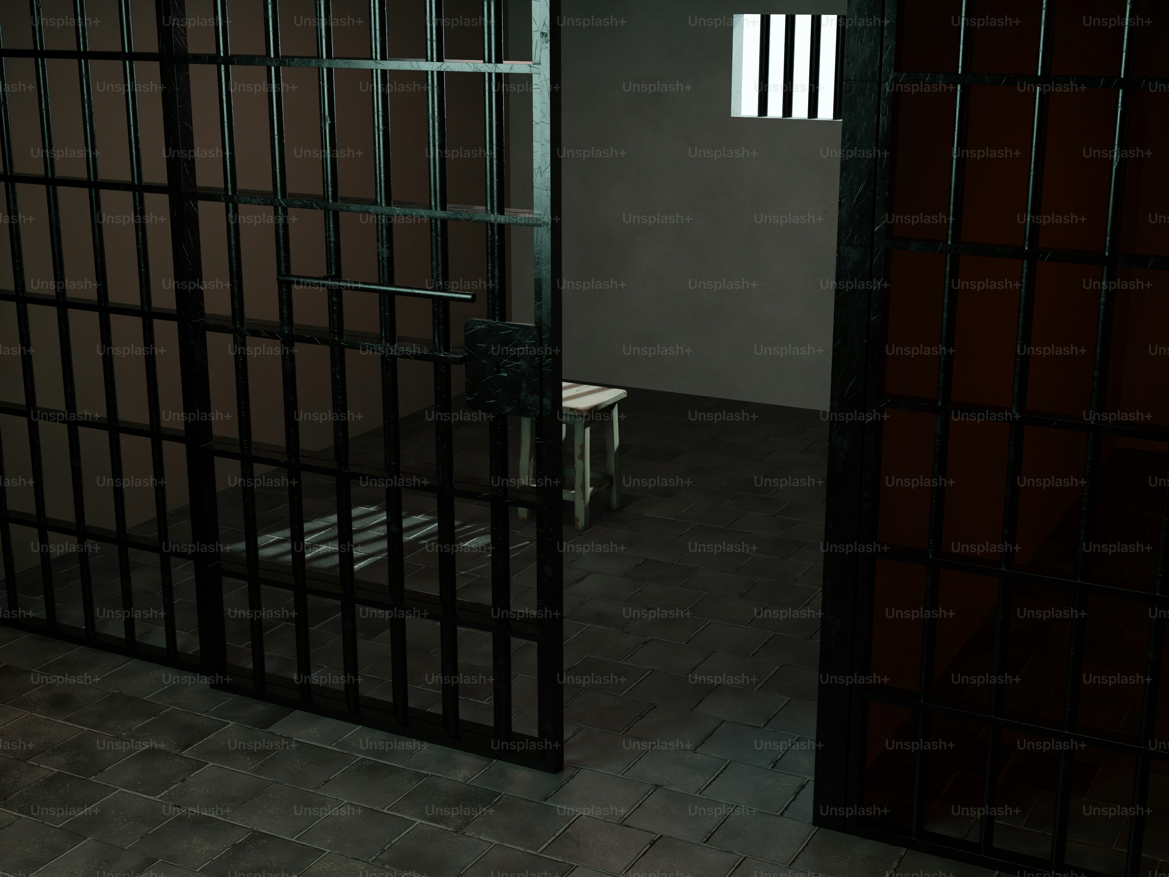 Empty jail cell with open bars and a stool photo – Architecture Image ...