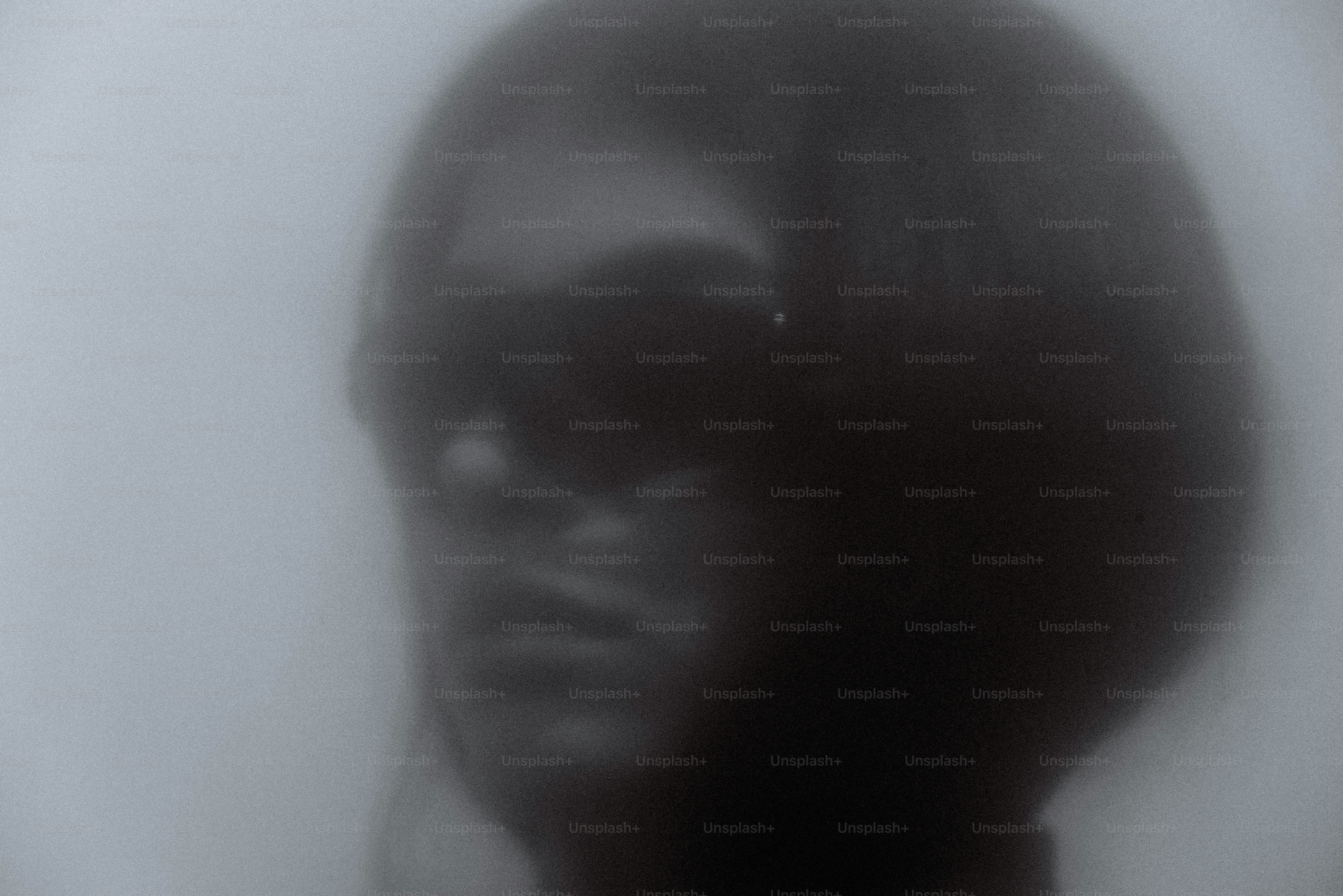 A young person with eyes closed, soft focus. photo – Portrait Image on ...