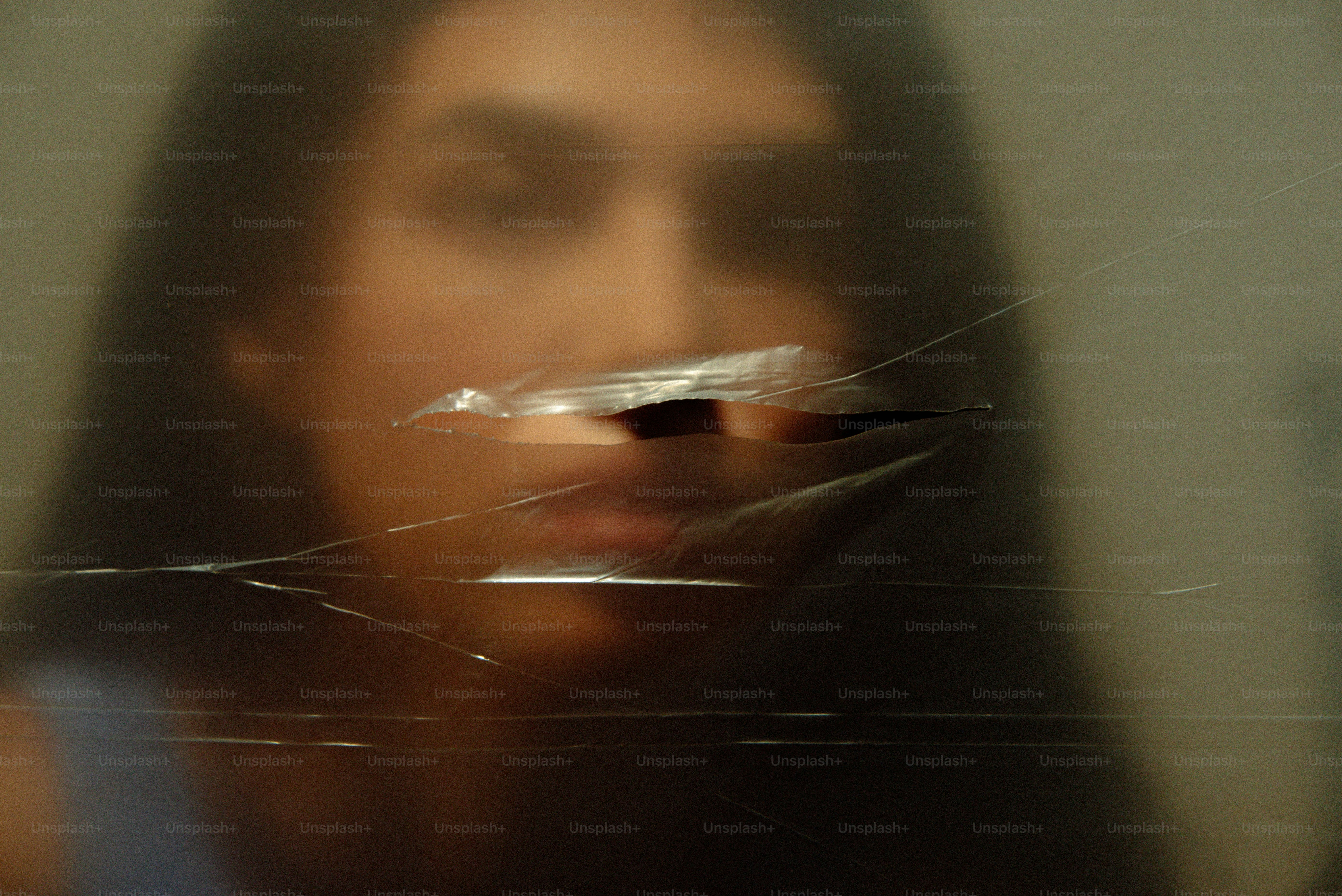 Blurred face seen through cracked glass photo – Face Image on Unsplash