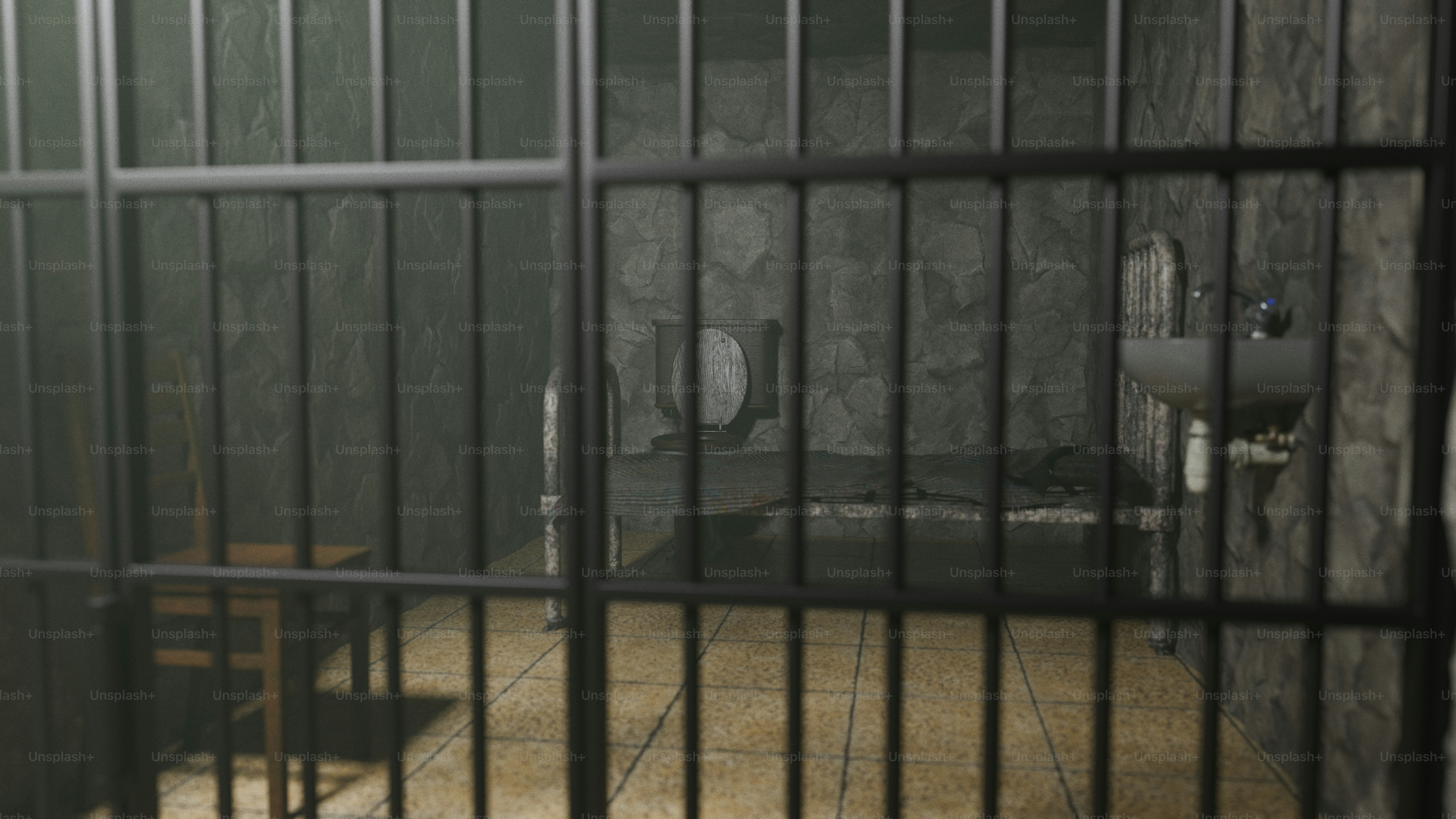 A simple prison cell with a bed and toilet. photo – Prison Image on ...