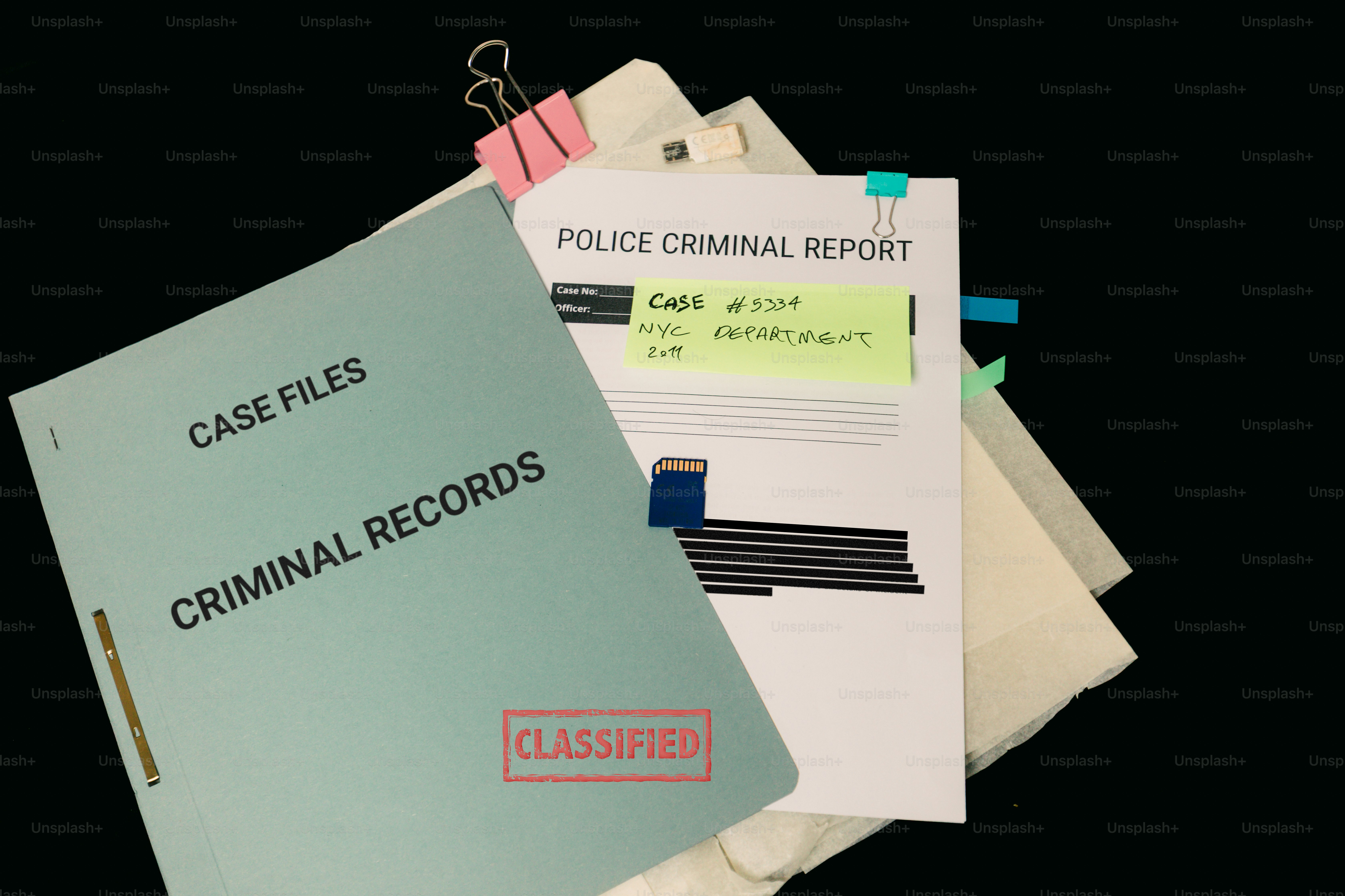Criminal records and police report documents. photo – Law Image on Unsplash