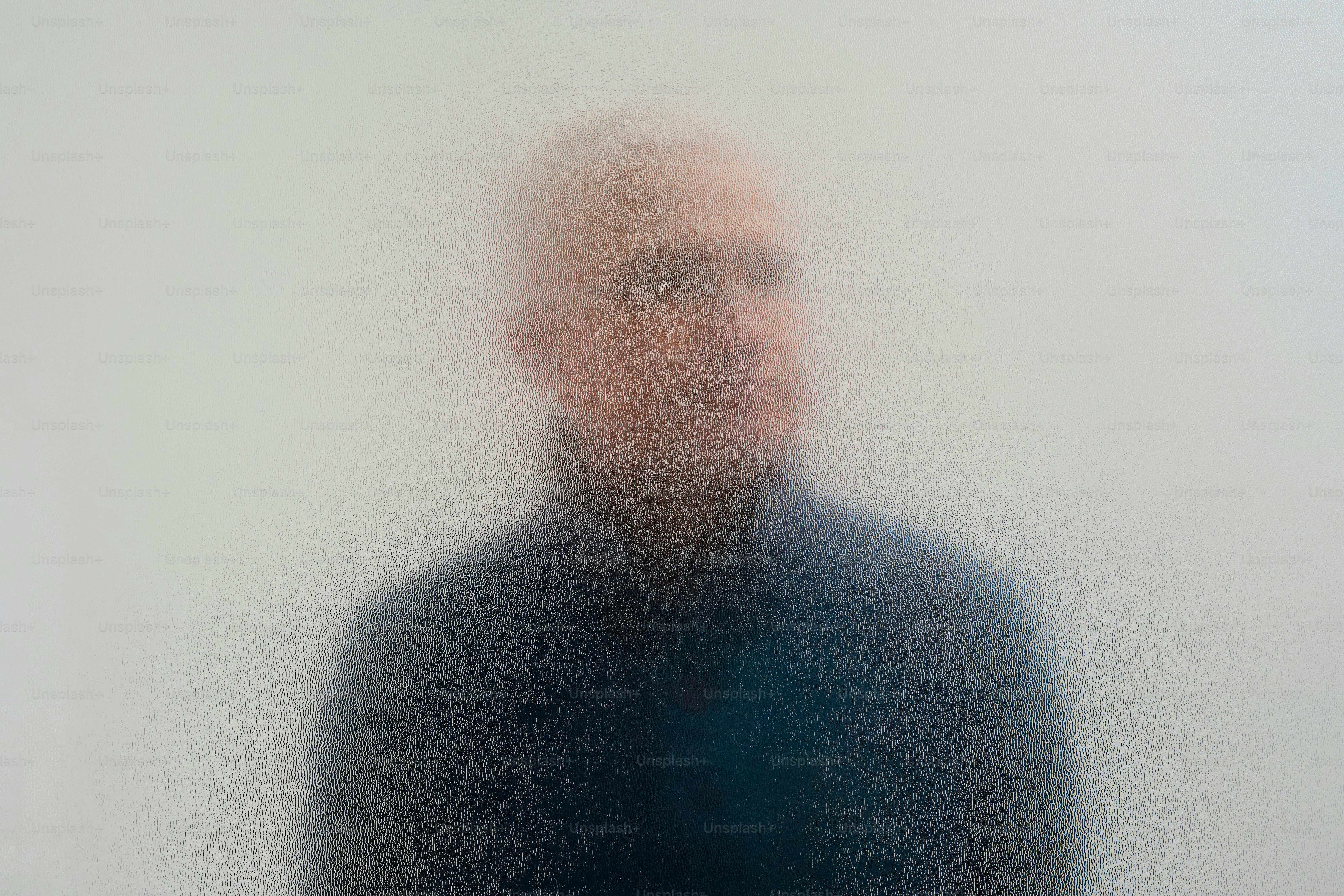 Man behind frosted glass with hand to ear photo – Portrait Image on ...
