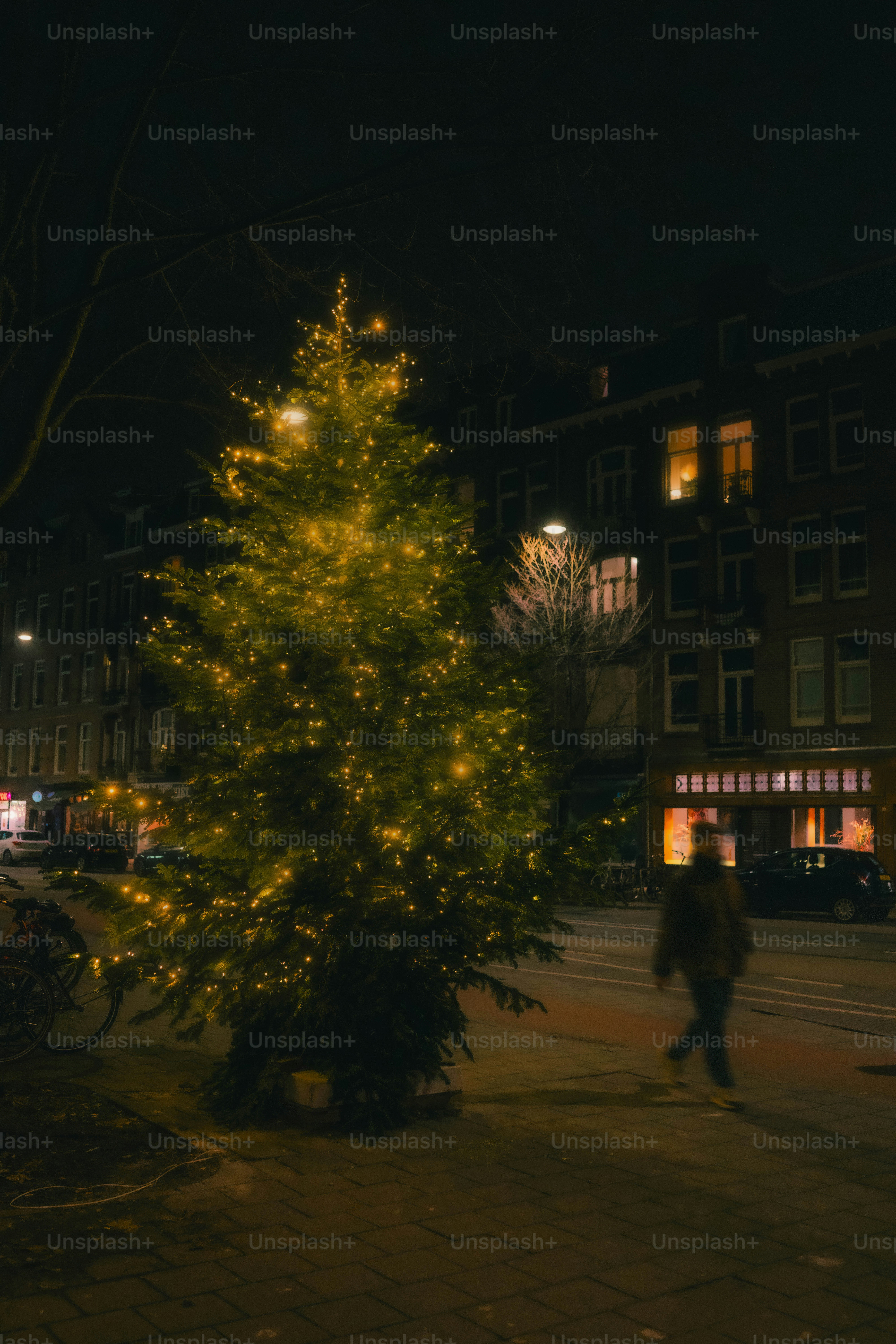 Row of houses decorated for christmas at night. photo – Christmas Image ...