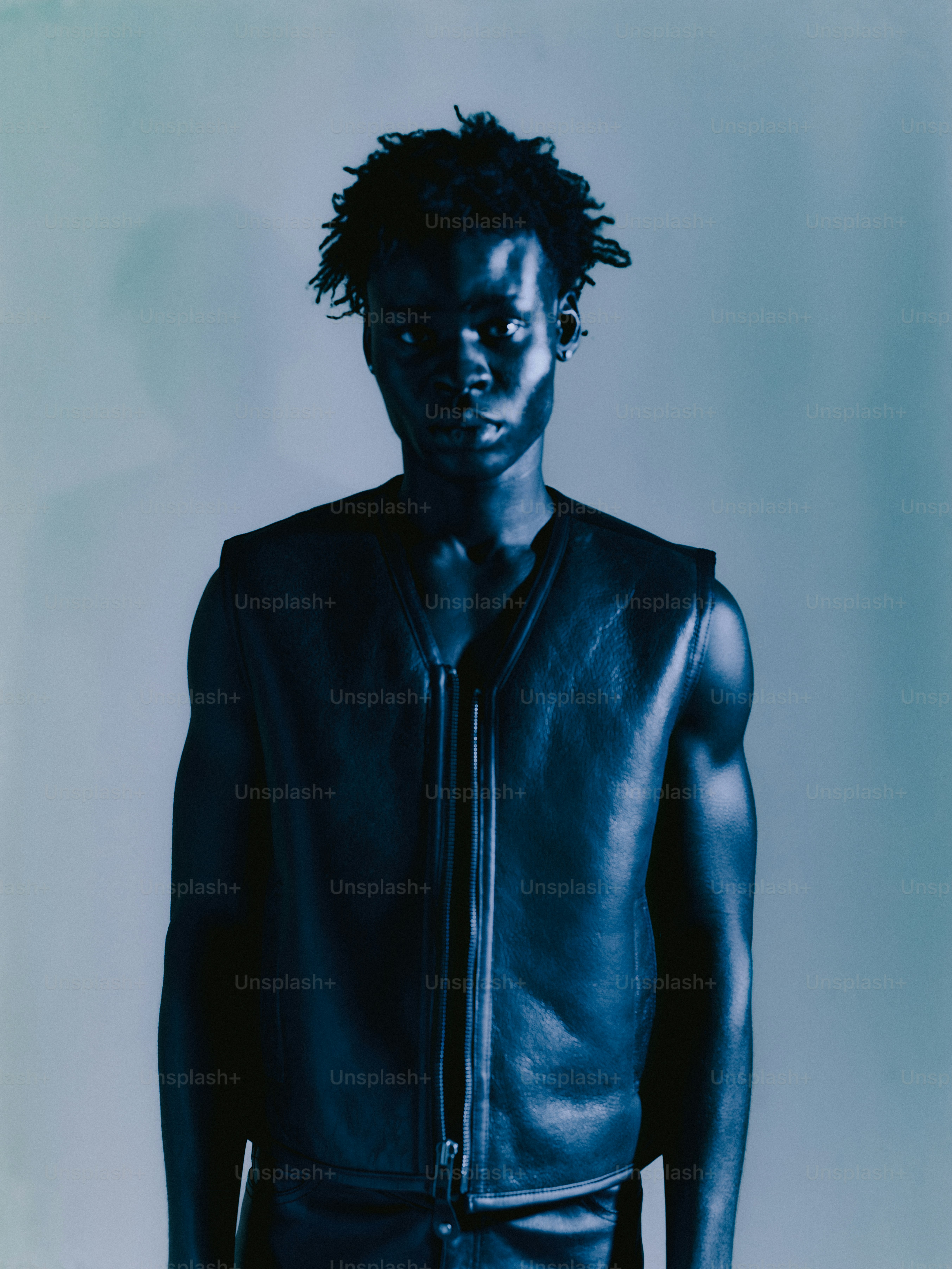 Silhouette of a man against a blue background photo – Portrait Image on ...