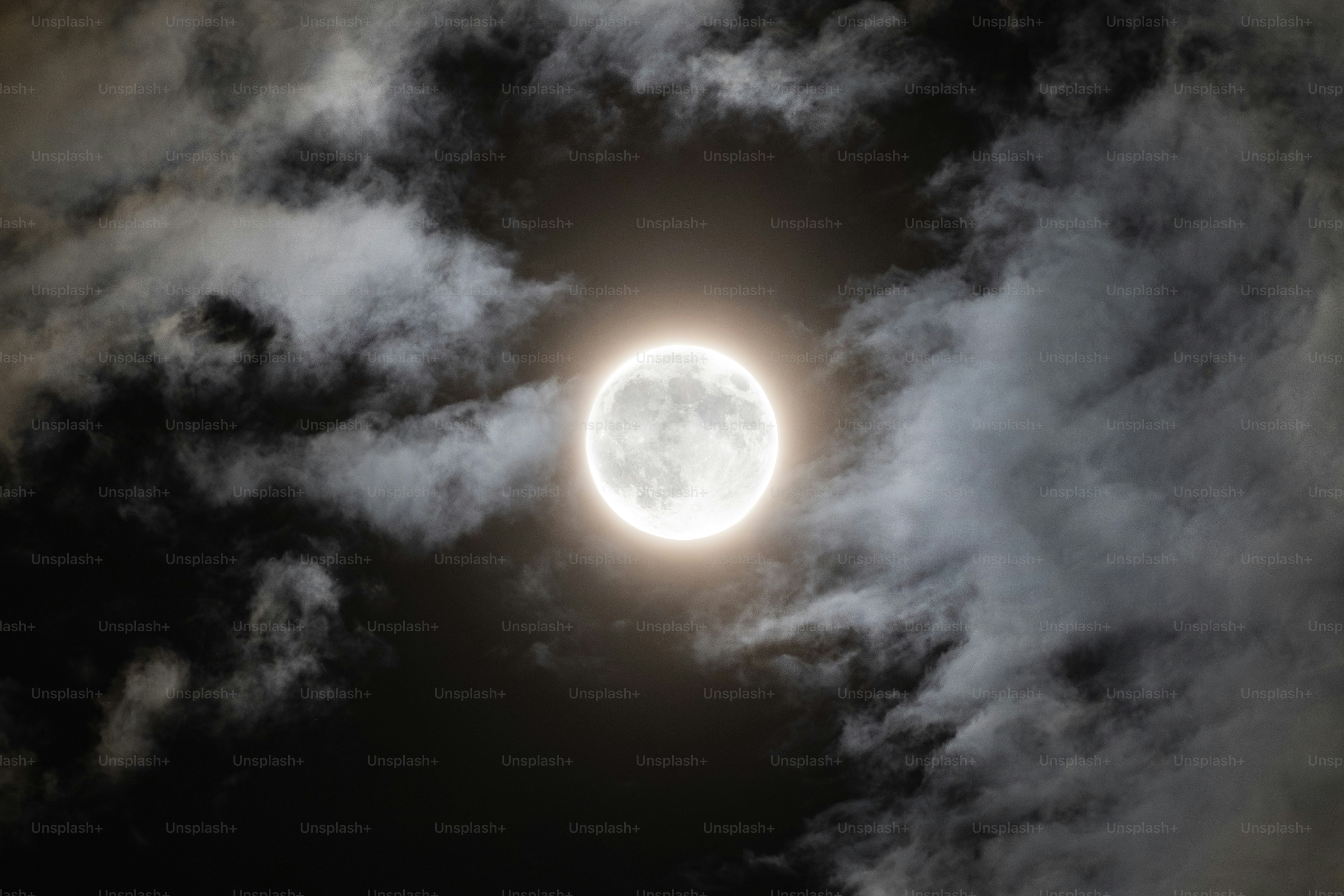 Full moon shining through dark clouds photo – Space Image on Unsplash