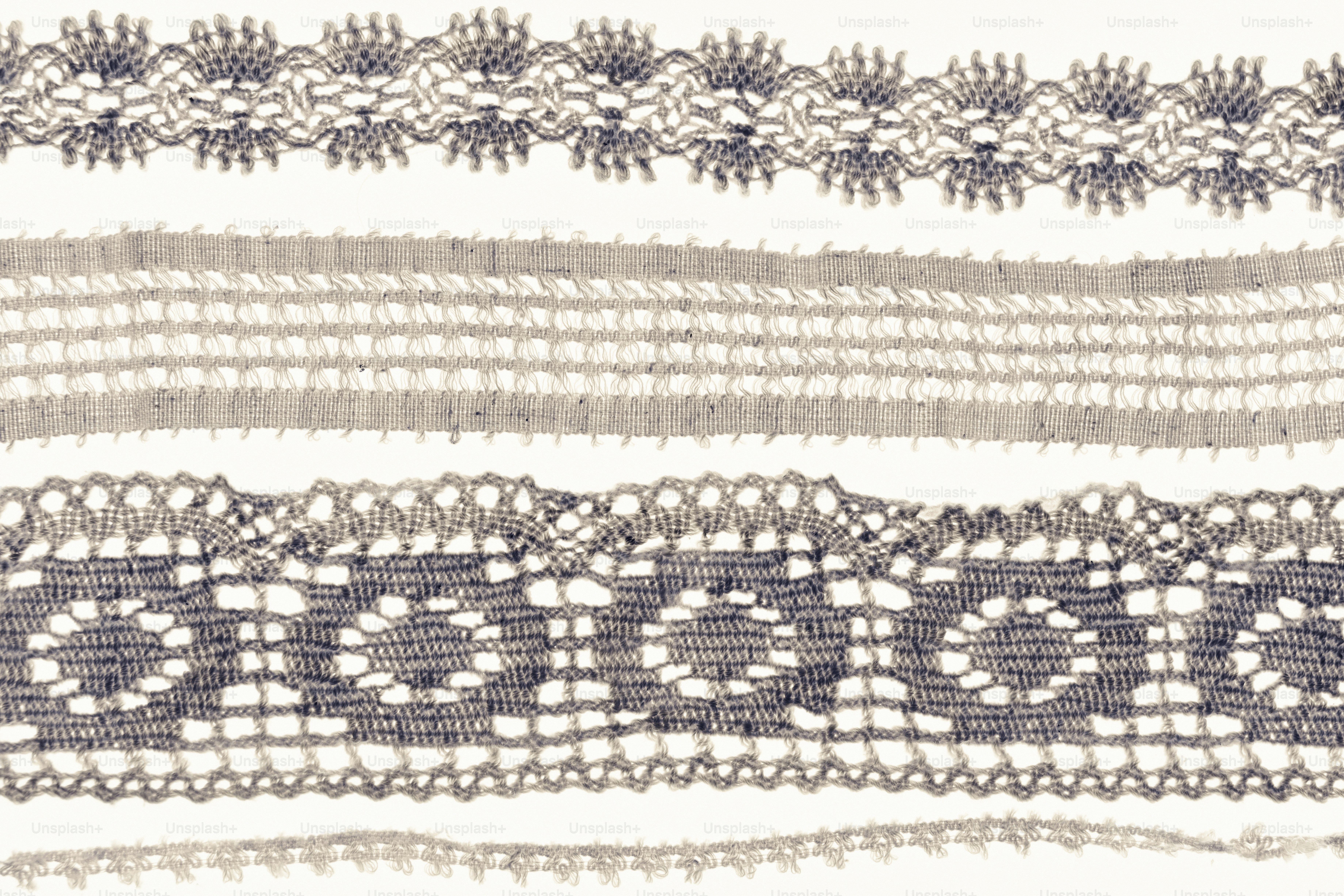 Close-up of decorative lace trim patterns photo – White background ...