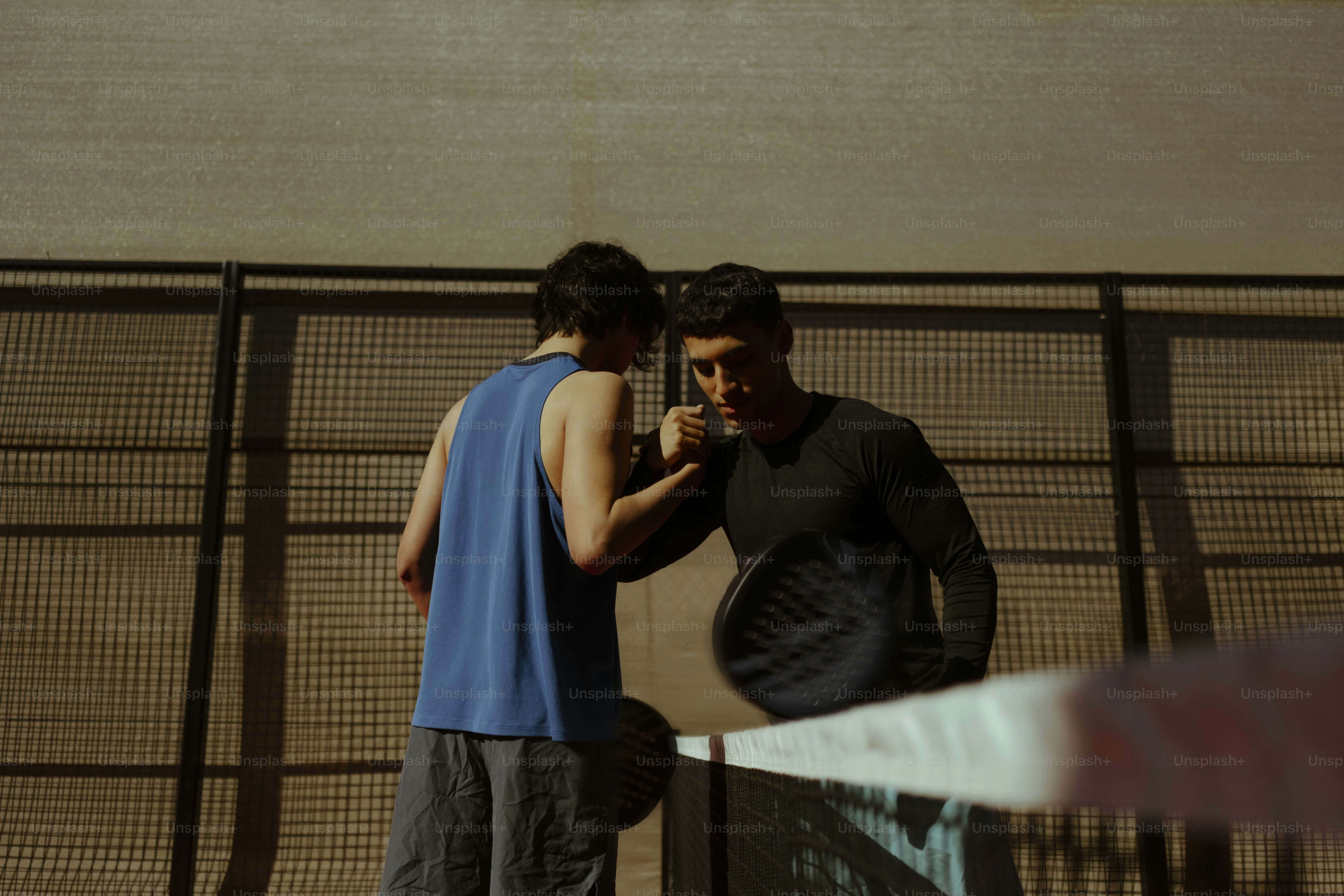 Two men training together in a boxing ring. photo – Fitness Image on ...