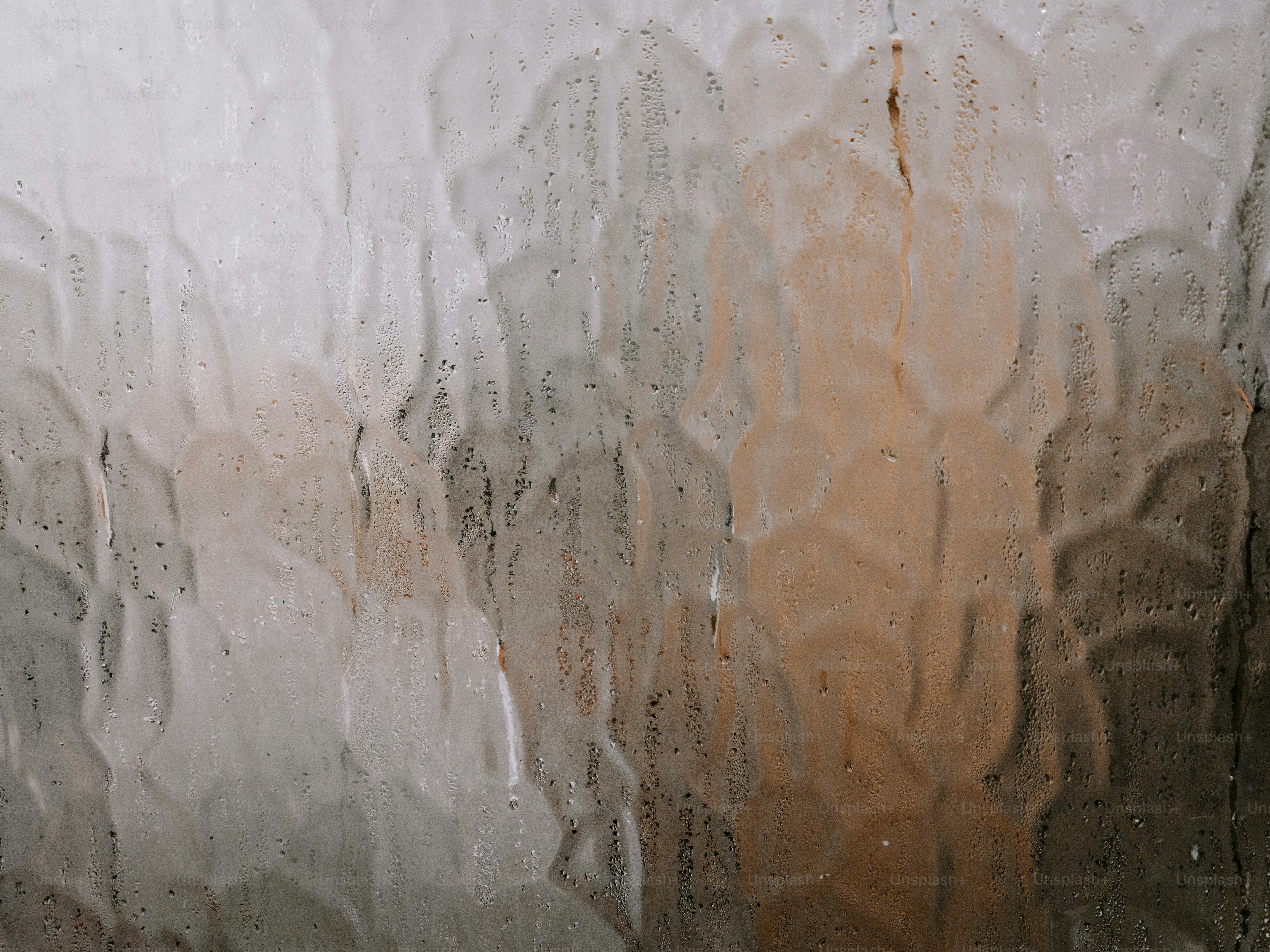 Textured glass with blurred abstract shapes and organic shapes. photo ...