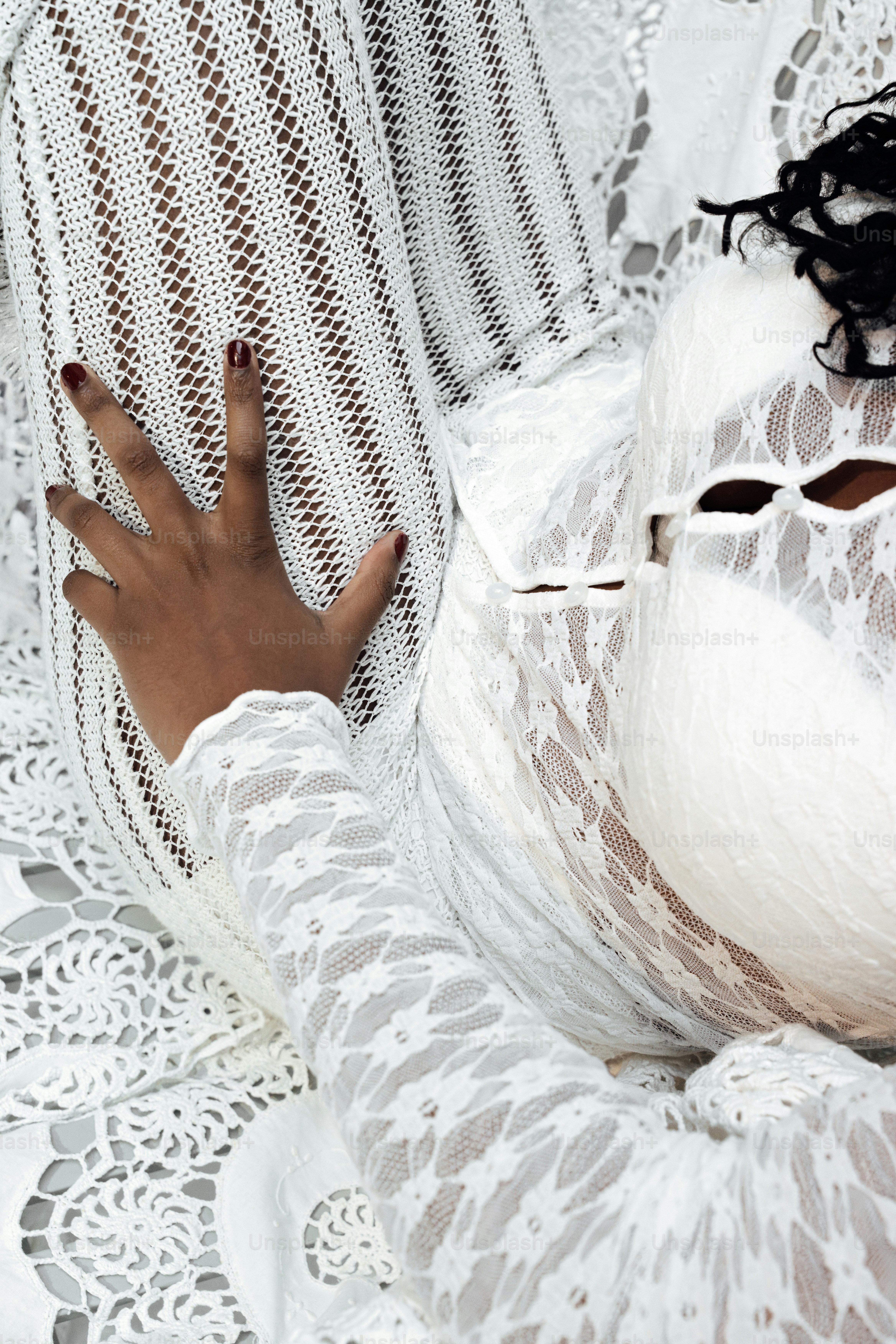 Two hands embracing a person in a lace dress photo – Texture Image on ...