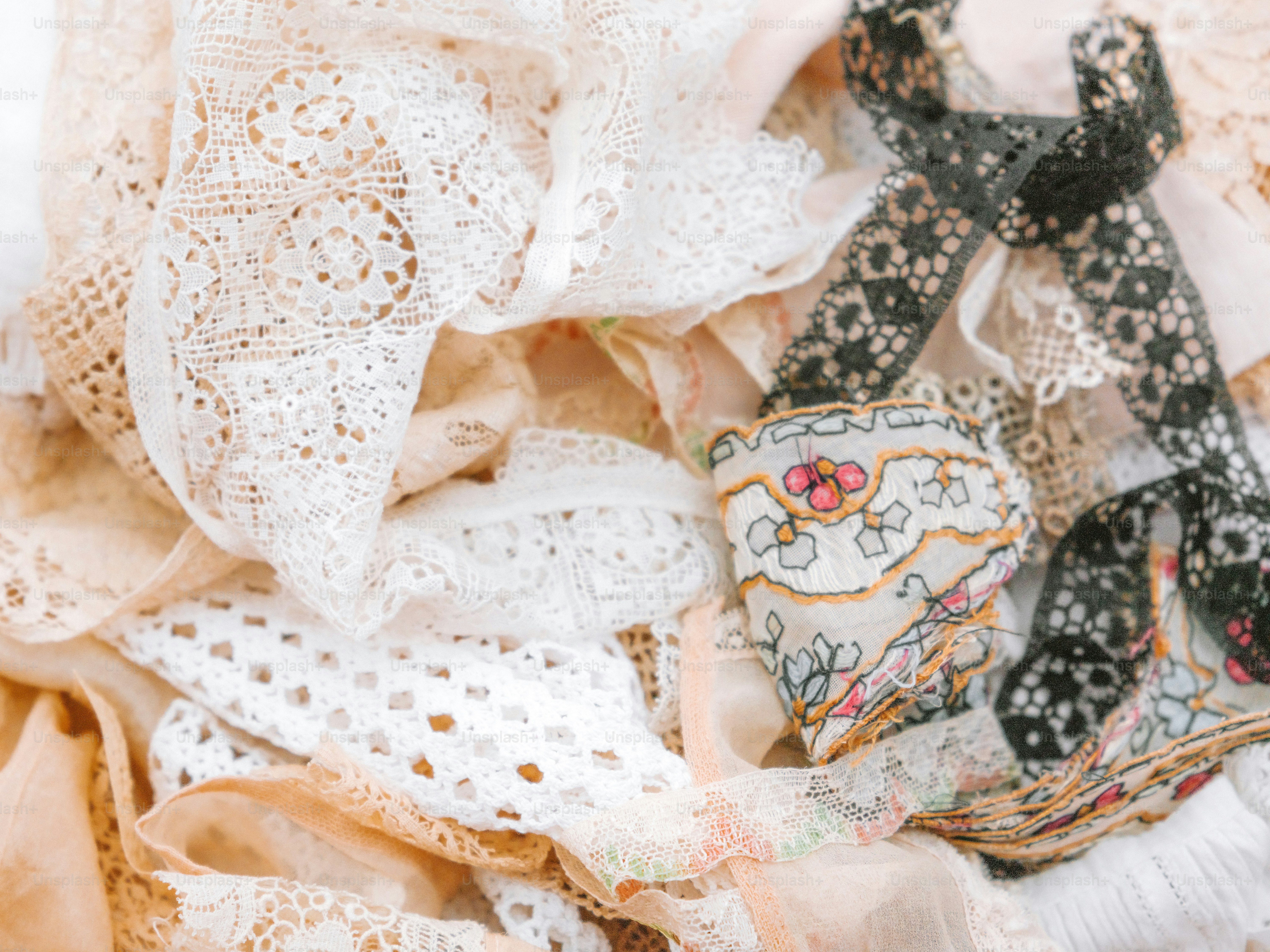 A collection of vintage lace and fabric scraps. photo – Sewing Image on ...