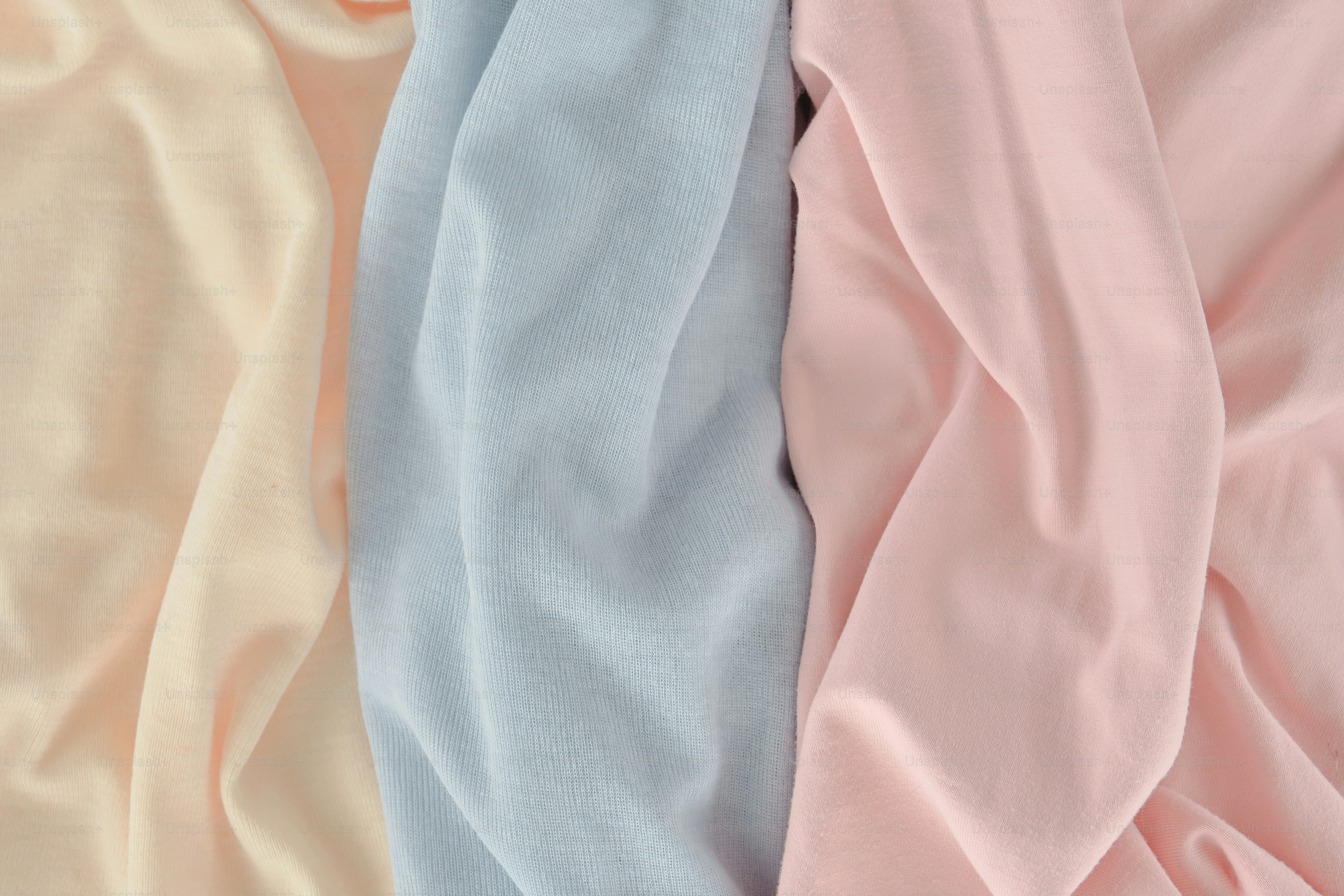 Soft pastel fabrics draped in gentle folds photo – Wallpaper Image on ...