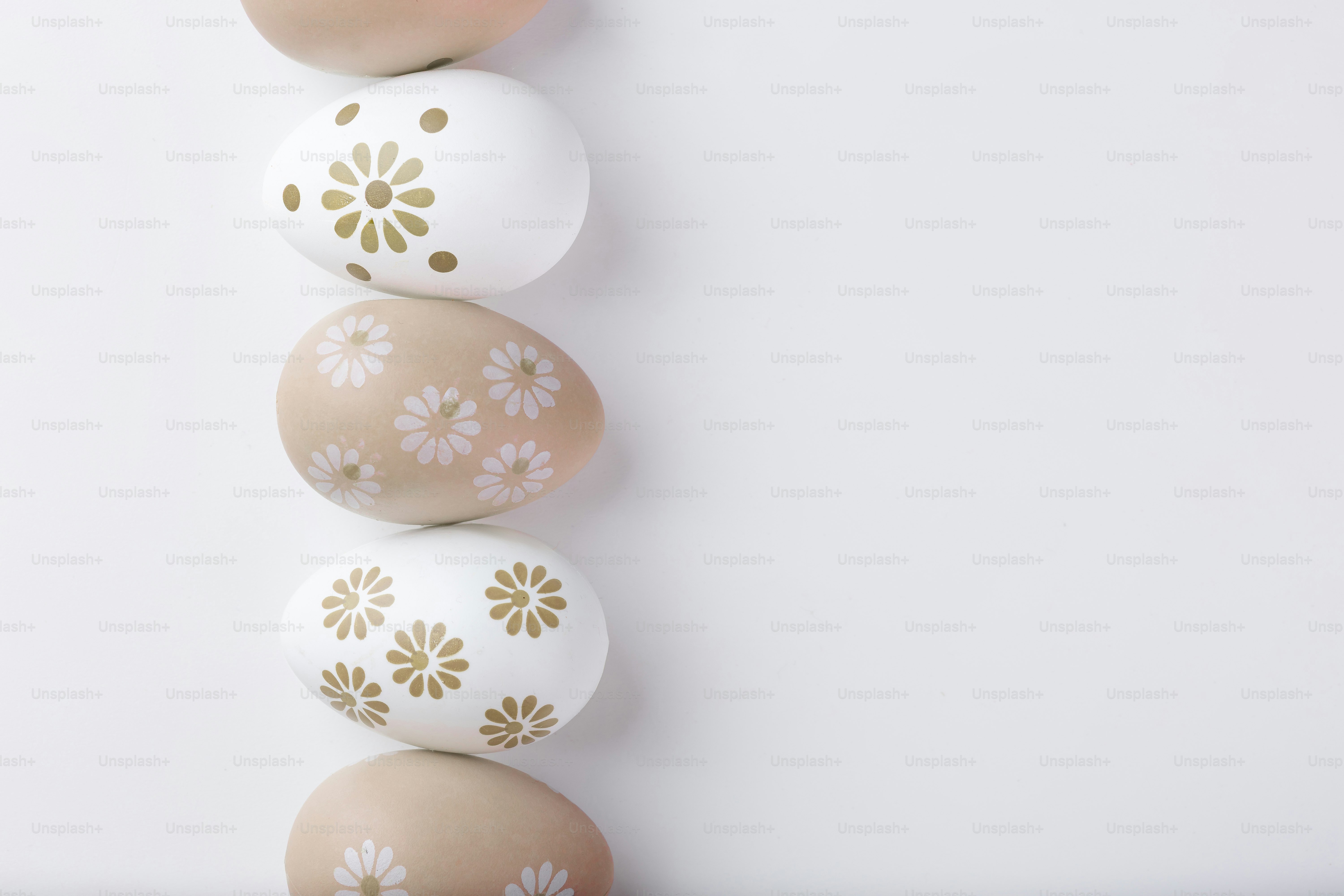 Decorated easter eggs in a row on white background photo – Easter Image ...