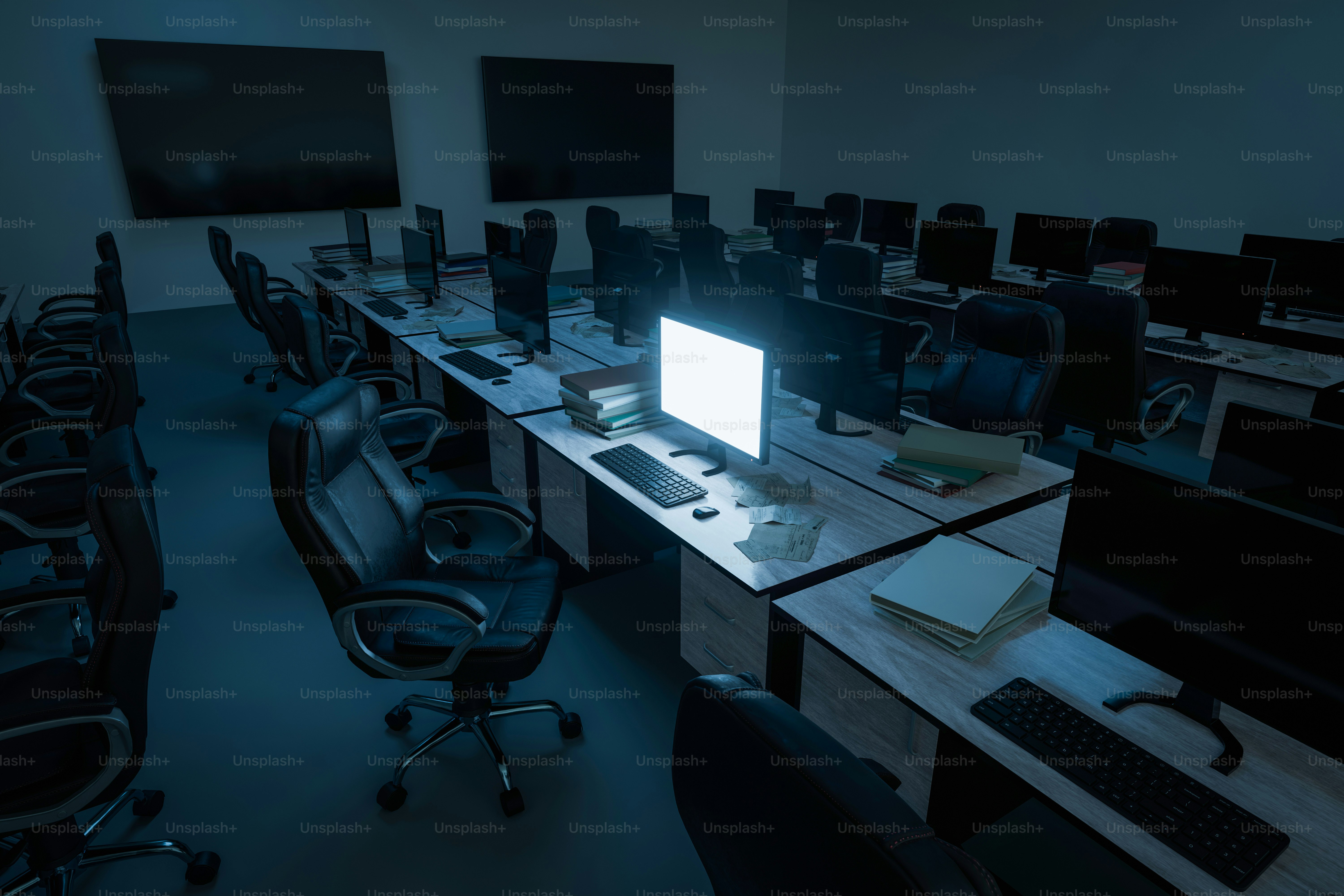 Modern office desks with laptops and chairs at night. photo – Laptop ...