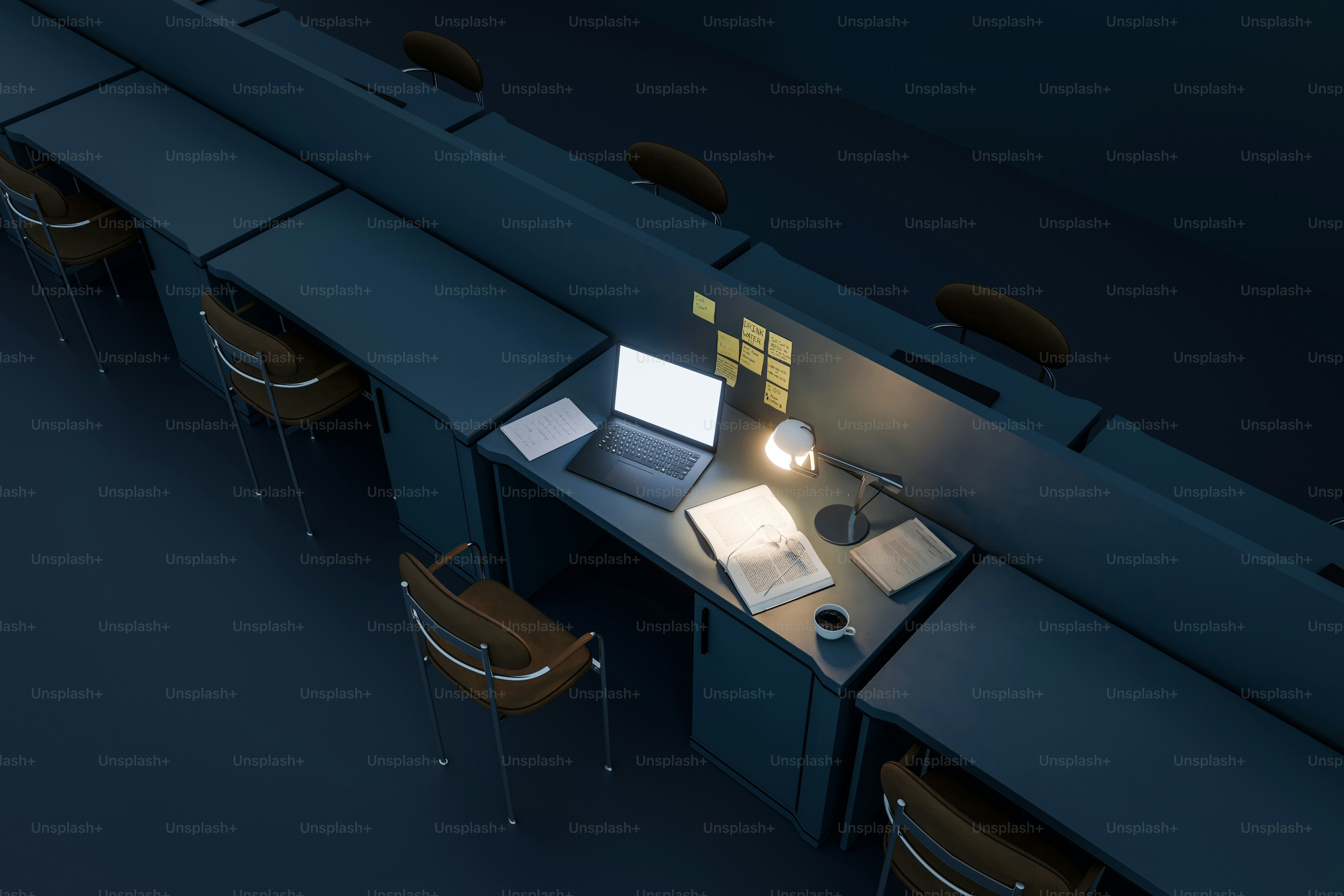 Modern office desks with laptops and chairs at night. photo – Laptop ...