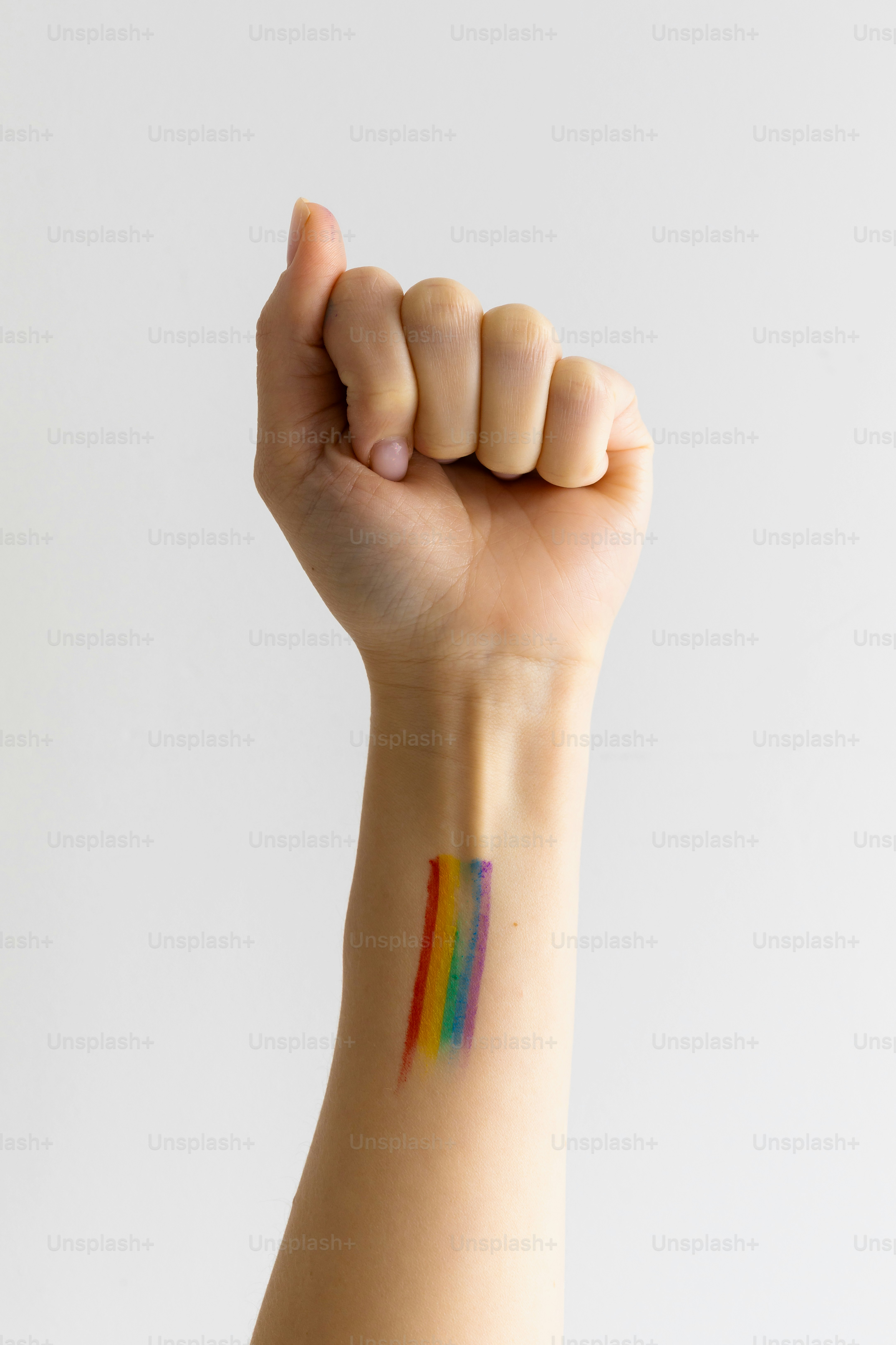 Person wearing rainbow flip-flops with painted hand photo – Love Image ...