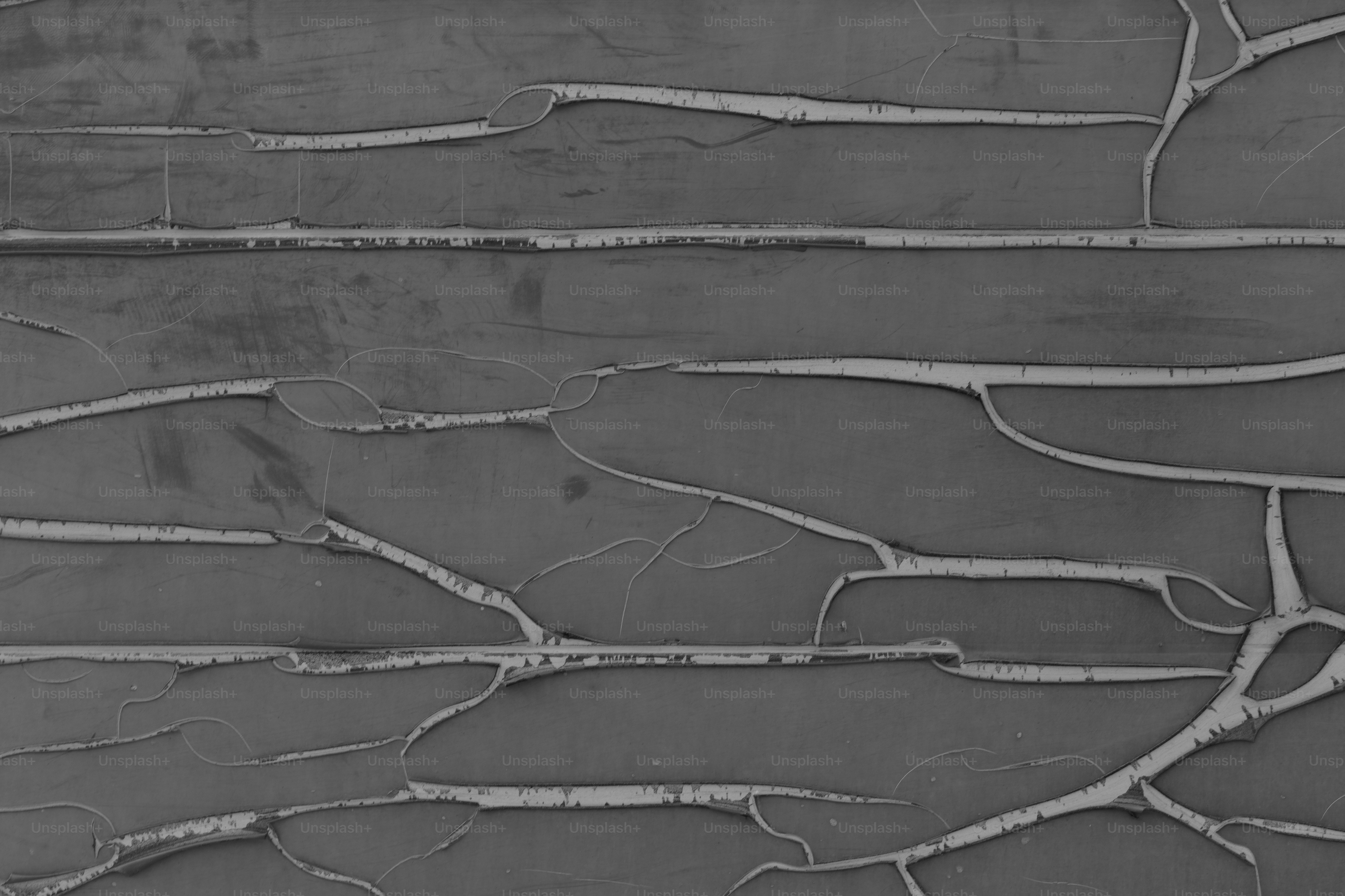 Textured dark green weathered surface with streaks and spots. photo ...