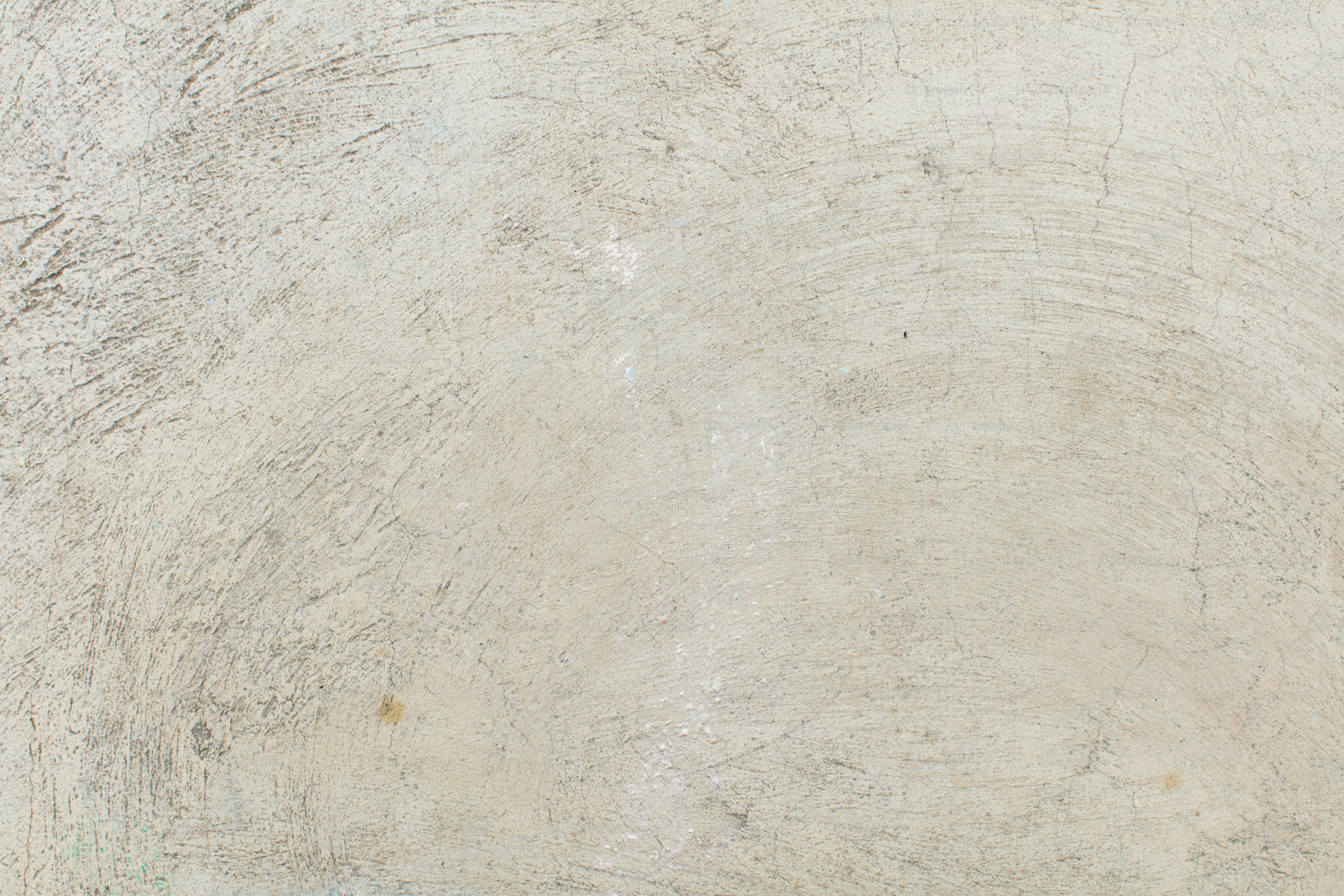 Una superficie de hormigón de textura beige clara con sutiles ...