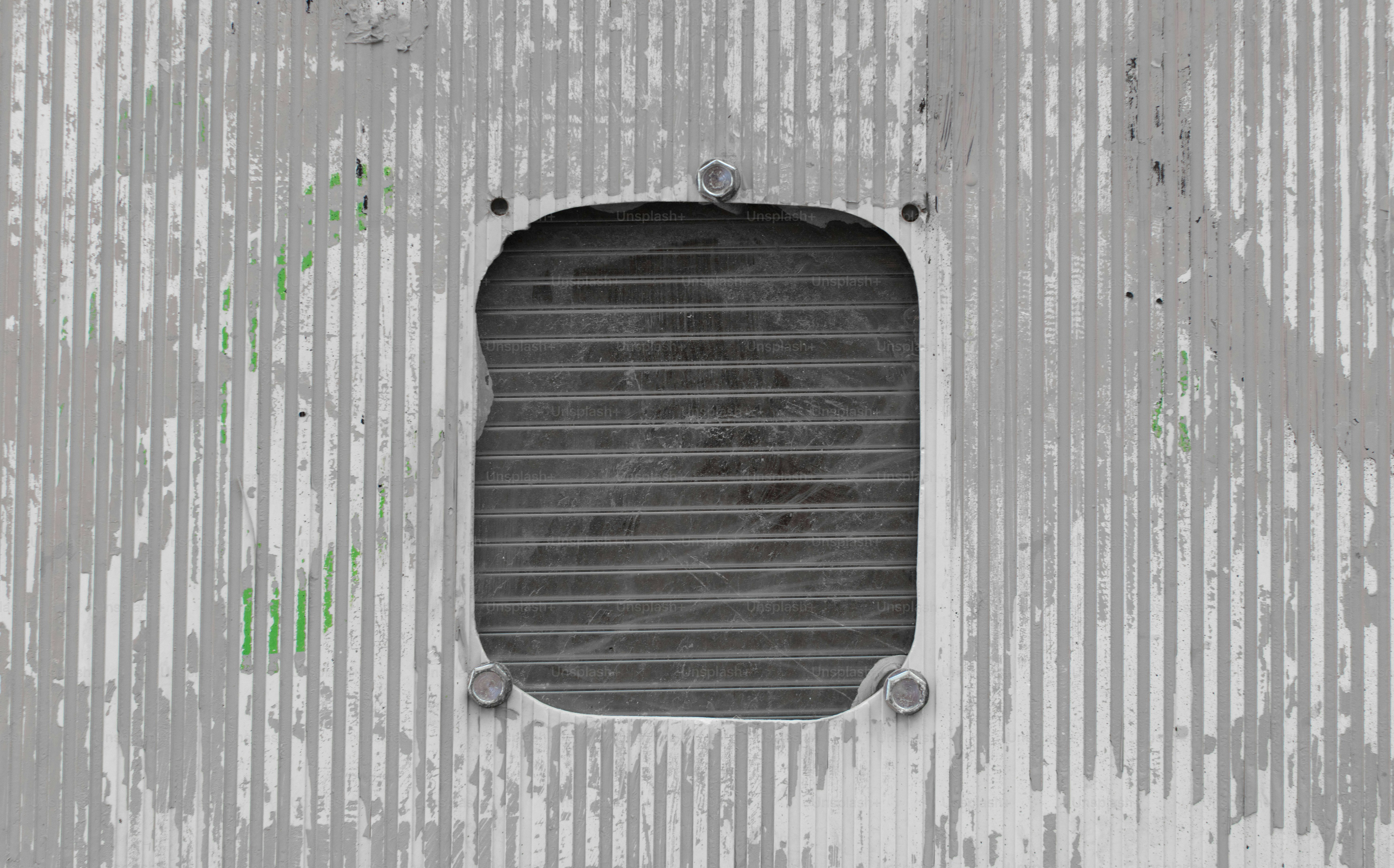 Weathered corrugated metal wall with a square vent. photo – Wallpaper ...