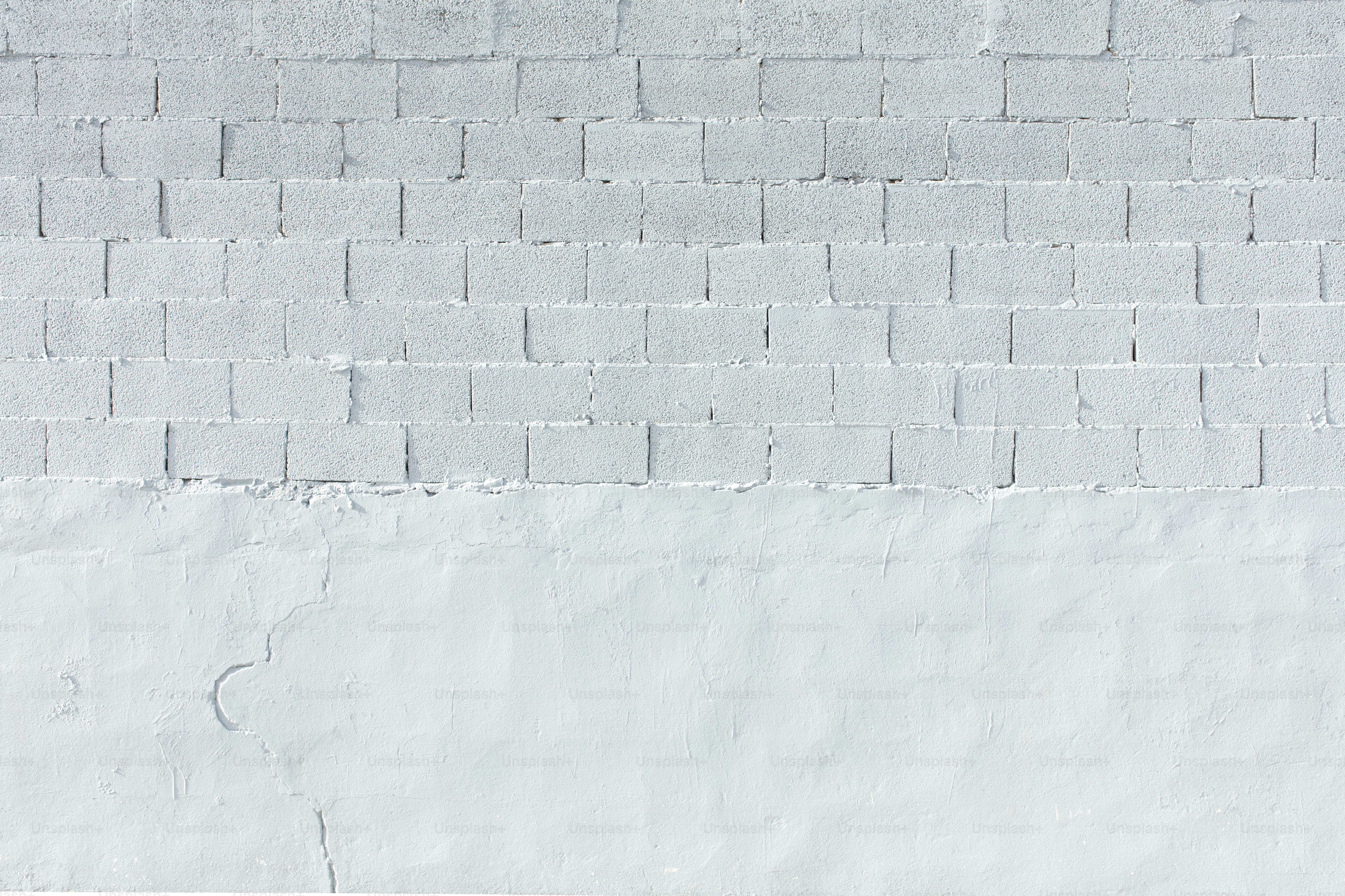 Deep vertical crack in a textured white wall. photo – Wallpaper Image ...