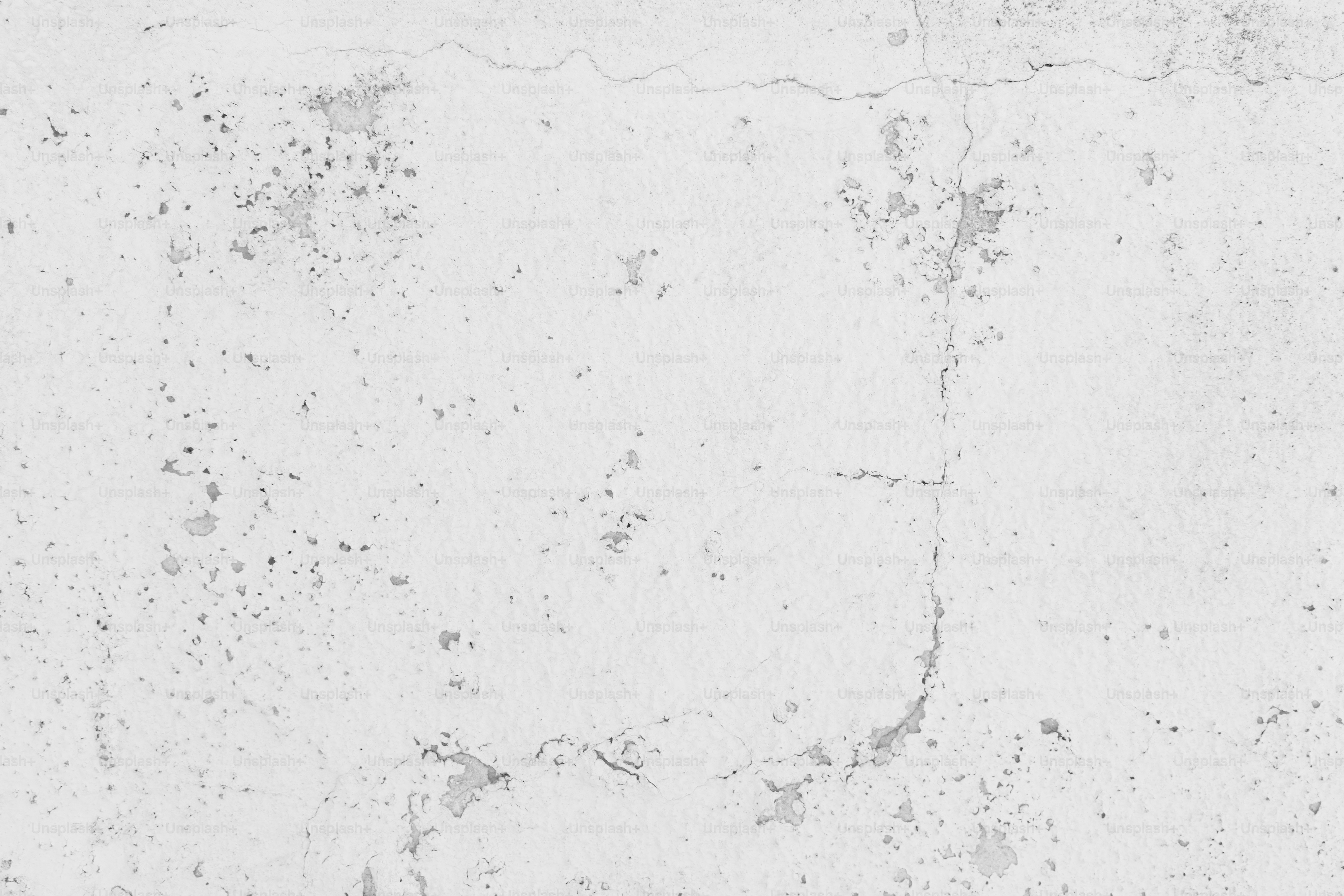 Weathered concrete wall with distinct light and dark textures. photo ...
