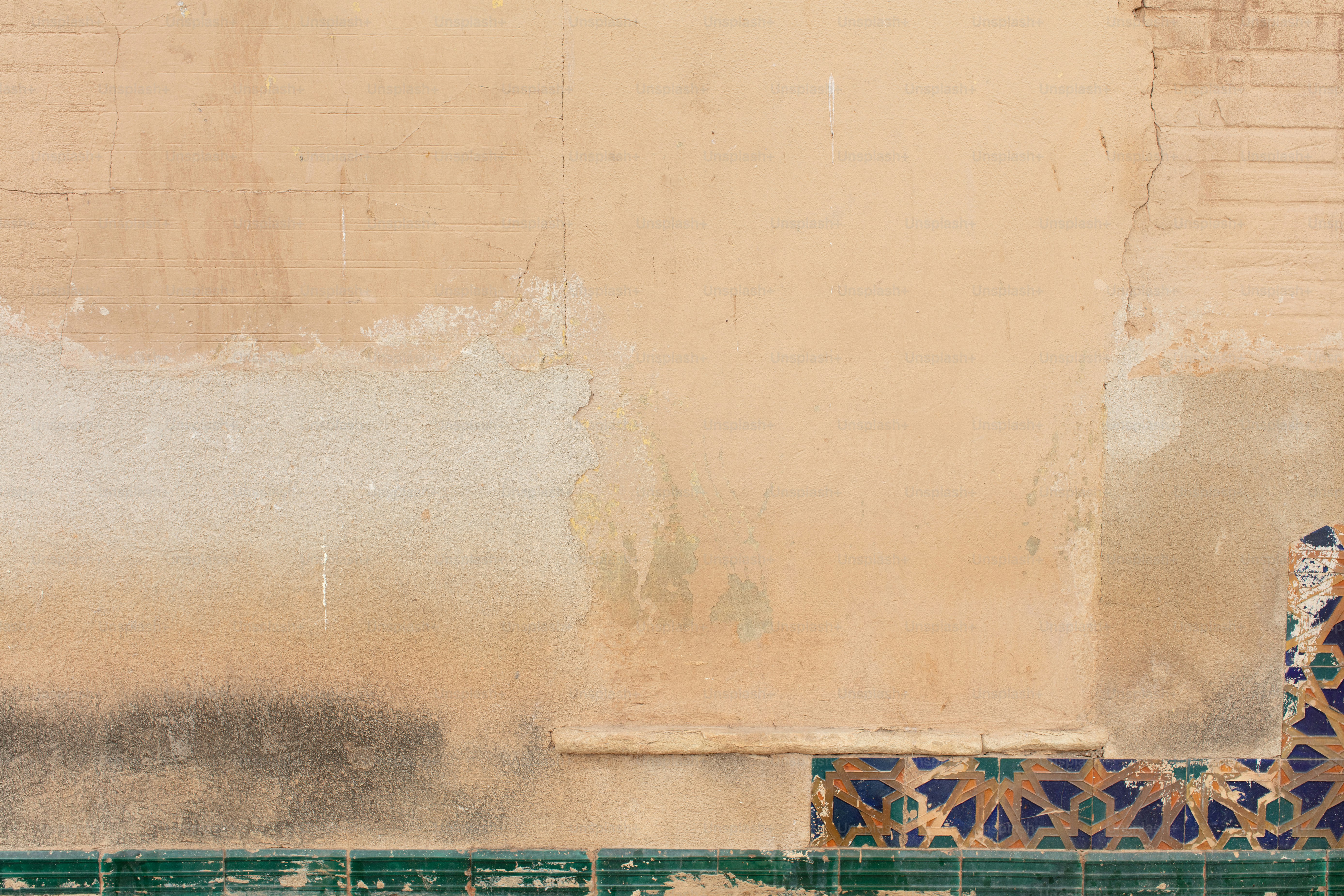 Rough concrete wall with peeling blue and white paper texture. photo ...